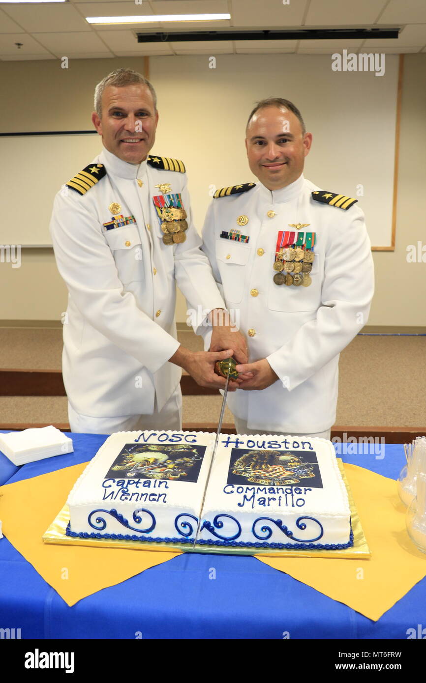 HOUSTON -- Capt. Van T. Wennen (left) and Cmdr. Reinaldo J. Morillo ...