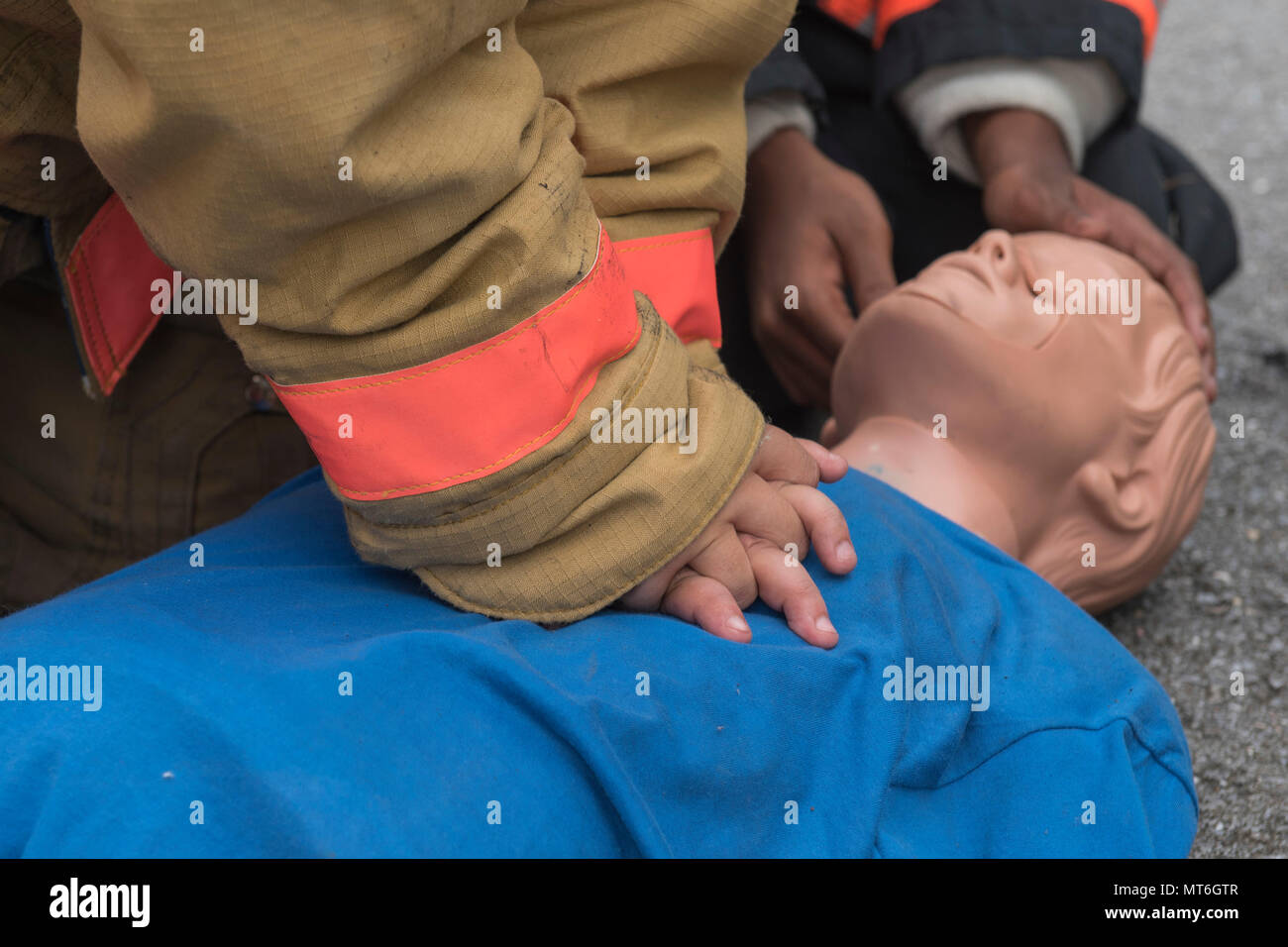 Joint Base Andrews Fire Explorer Academy cadets perform CPR on a ...