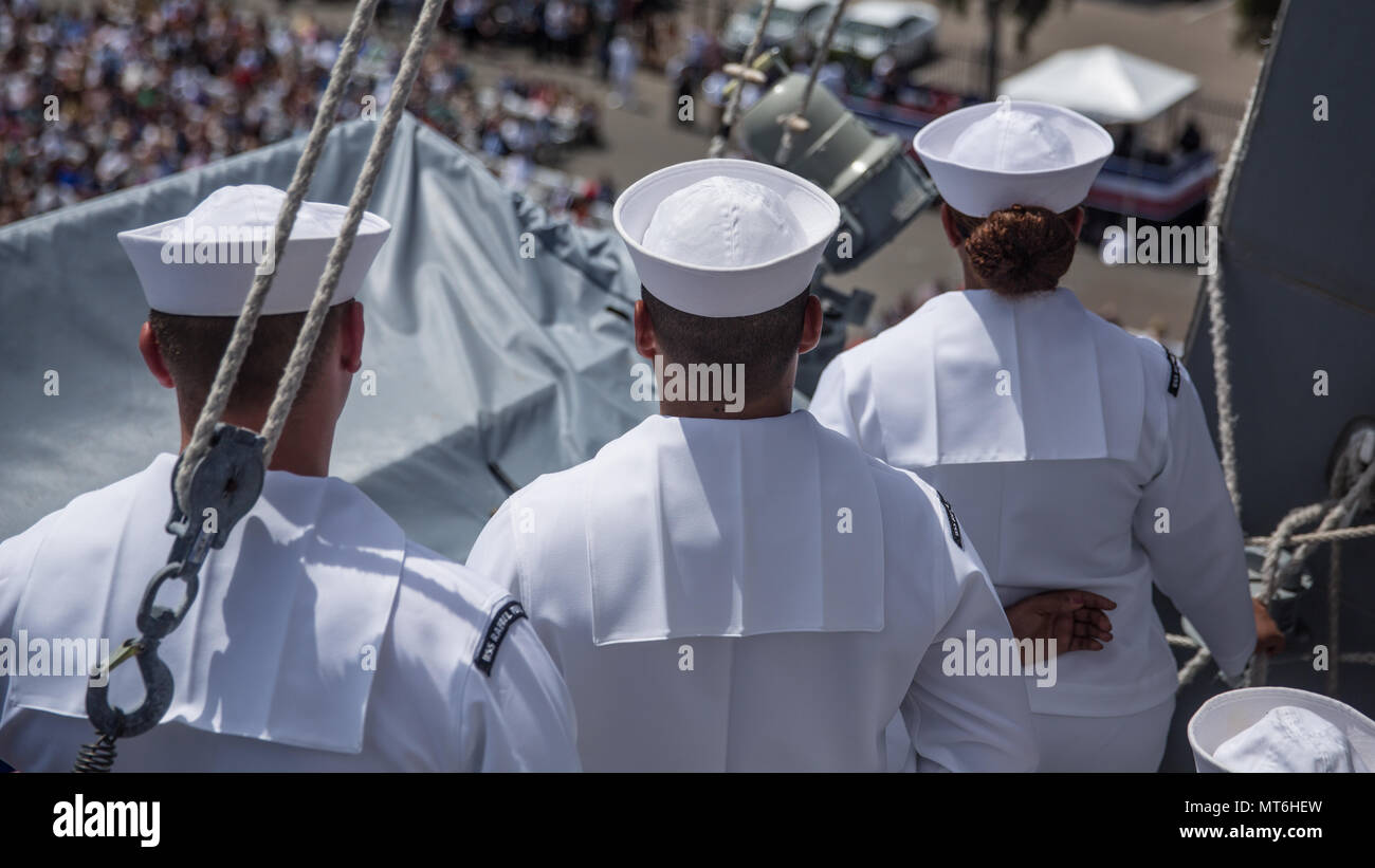 Sailors with the Navigation Division, USS Rafael Peralta (DDG 115) man ...