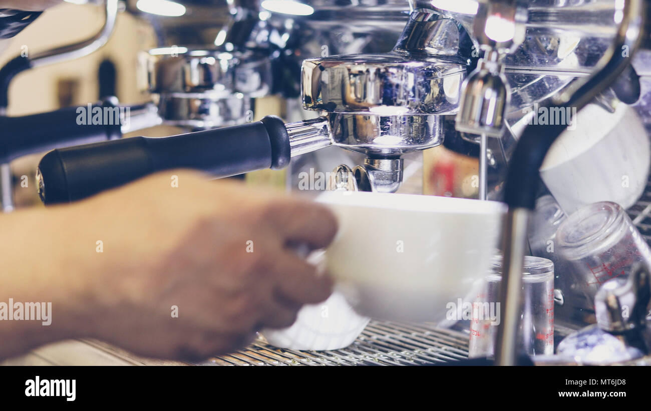 Asian men Barista using coffee machine in coffee shop counter - Working ...