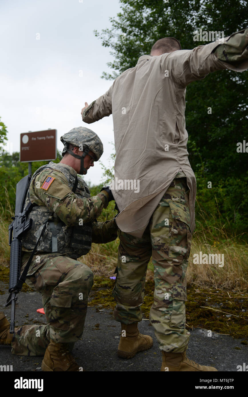 U.S. Army Pfc. Jacob Ruth assigned to 2ND Signal Brigade, searches and ...