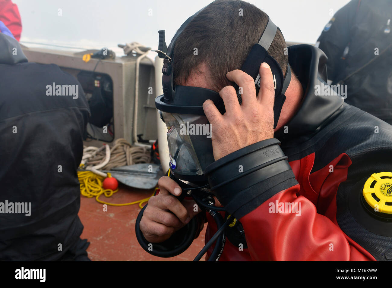 Coast Guard Petty Officer 1st Class David Bradbury, a member of a joint ...