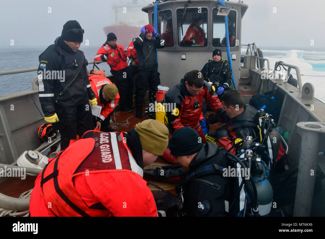 Joint coast guard navy dive team hi-res stock photography and images ...