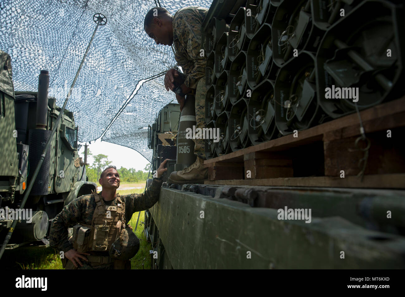 U.S. Marine Corps Lt. Col. Marcus J. Mainz, left, commanding officer of ...