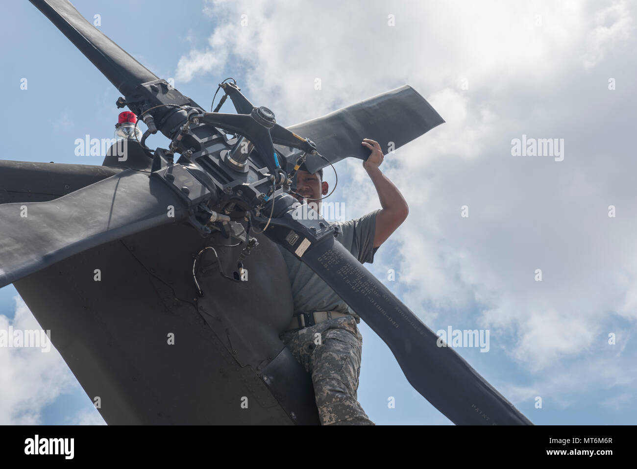 U.S. Army Aviation Battalion Japan Sgt. Reymark Racadio, UH-60 Black ...