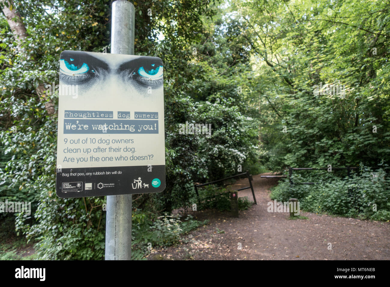 Clean up the dog poo sign Stock Photo - Alamy