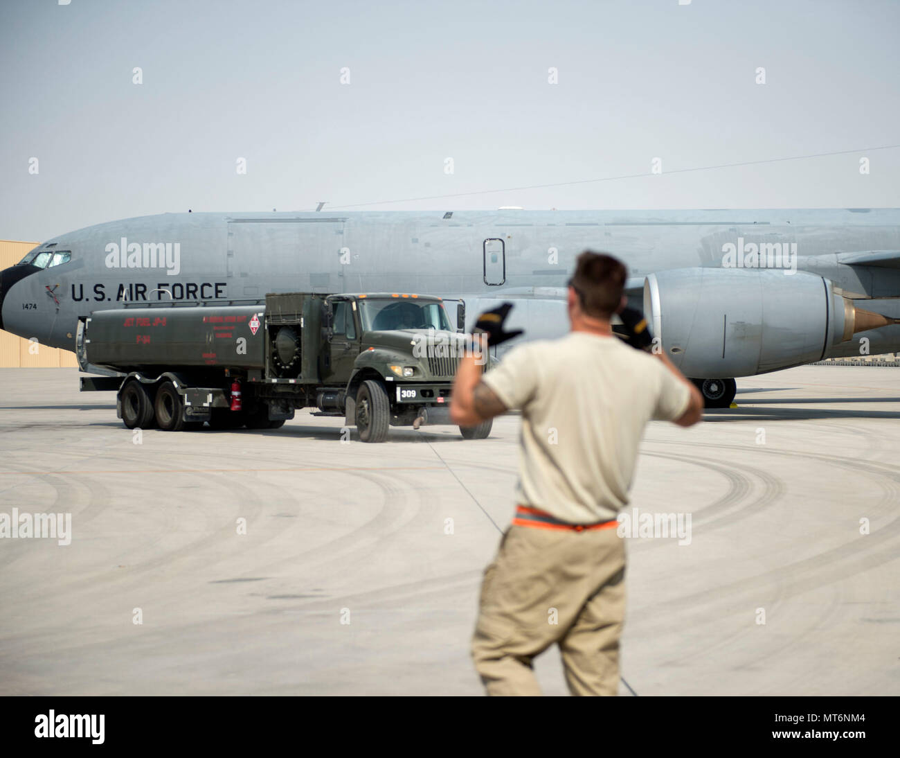 U.S Air Force Staff Sgt Ryan Bushey, a crew chief with the 340th ...