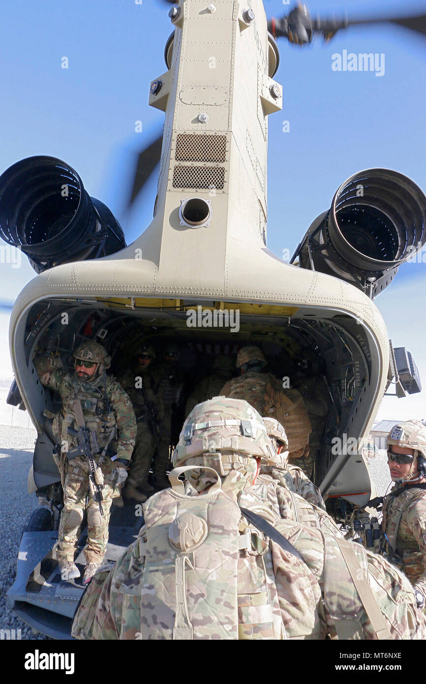Police Advisor Team members load on to a CH-47 Chinook Mar. 13 on their ...