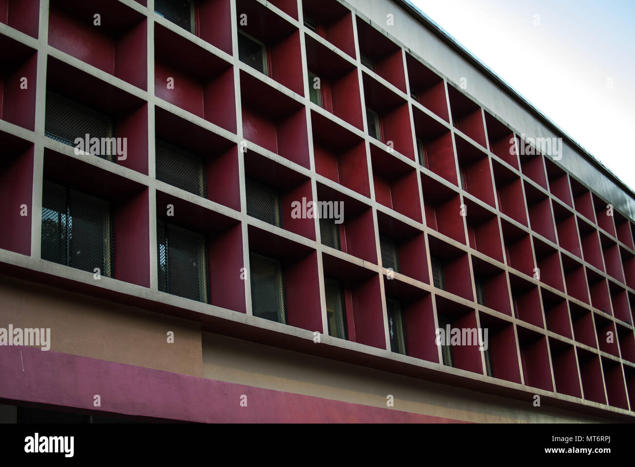 San Jose, Costa Rica. February 2, 2018. A red building with grated ...