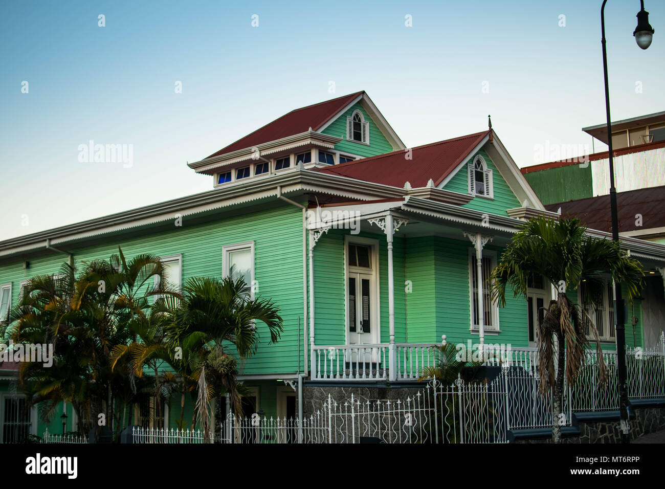 San Jose, Costa Rica. February 2, 2018. A green colonial building in ...