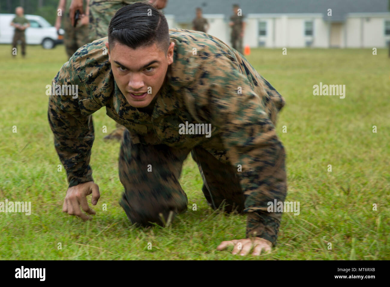 A U.S. Naval ROTC Midshipman participates in the manuever under fire ...