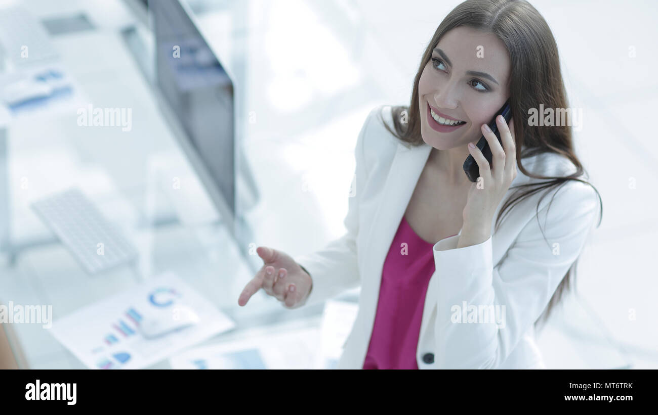 female Manager talking on the phone Stock Photo - Alamy