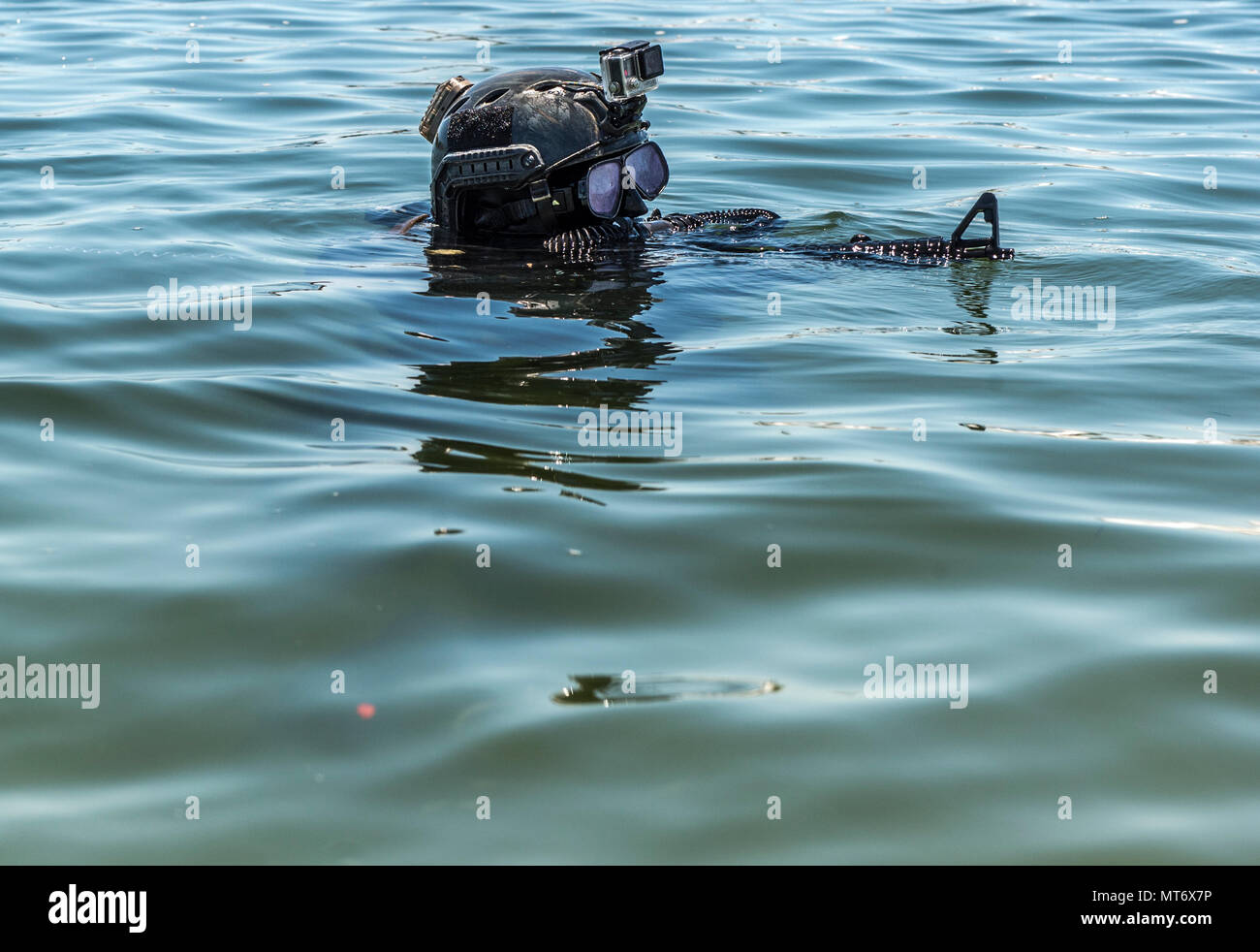 U.S. Navy Sea, Air, and Land Team Members conduct a proof of concept ...