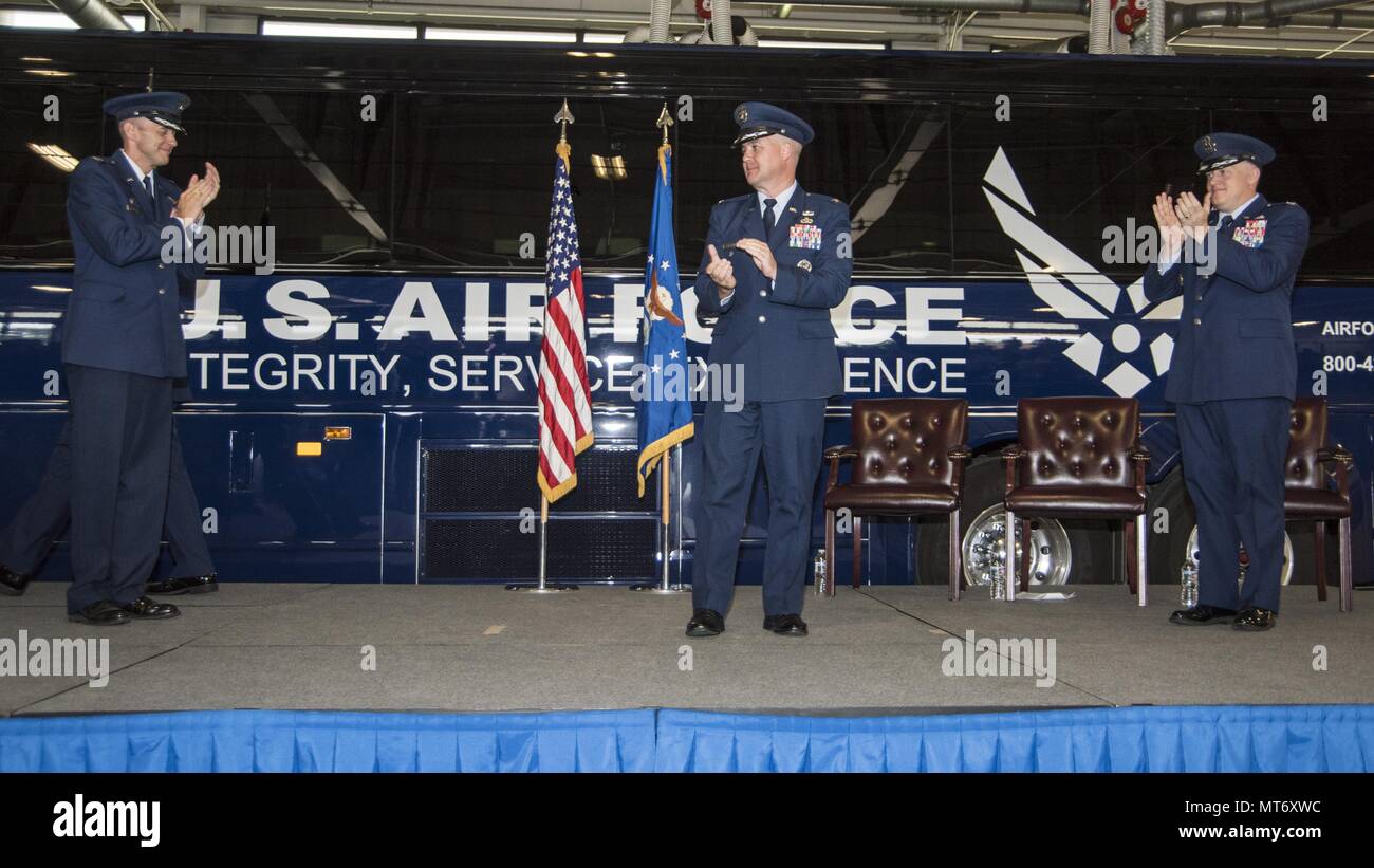 Col. E. John Teichert, left, 11th Wing and Joint Base Andrews commander ...