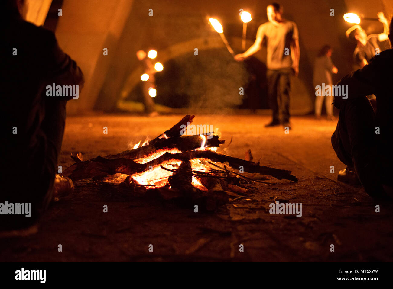 People watching fire spinning hi-res stock photography and images - Alamy