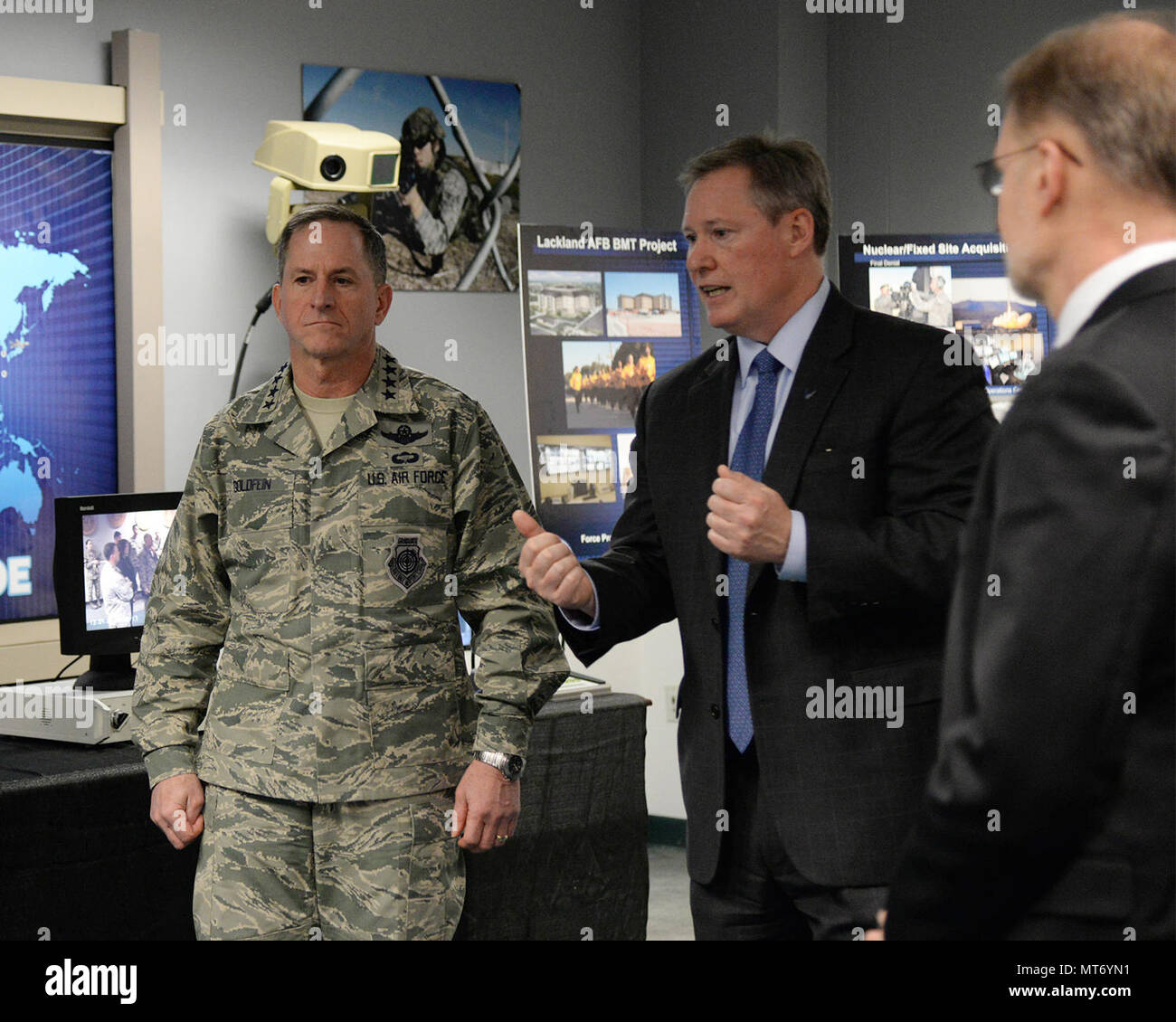 Pat Dagle, outgoing chief of the Force Protection Division, briefs Air ...