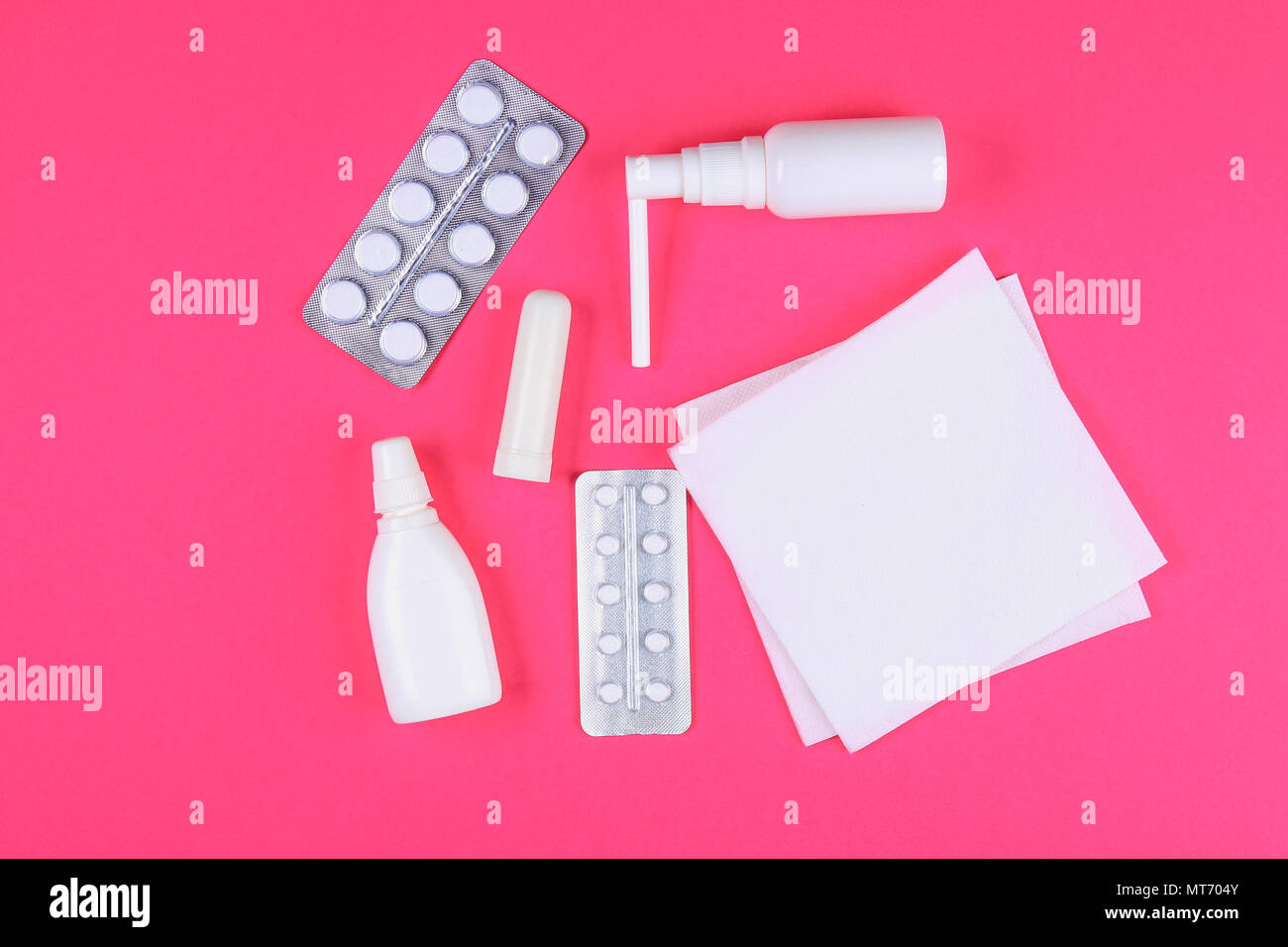 Medical remedies for colds, flu on a pink pastel background. Top view ...