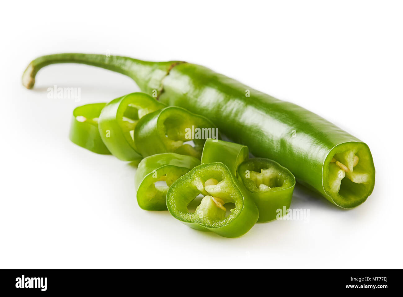 Fresh raw sliced green chili pepper isolated on white background Stock ...