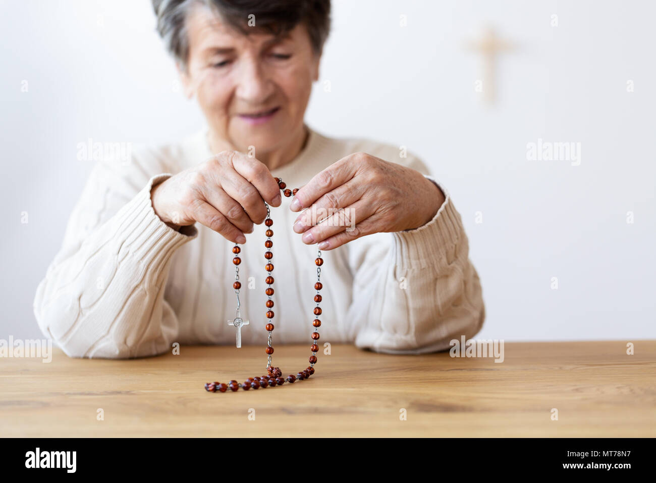 Happy person praying in catholic church hi-res stock photography and ...