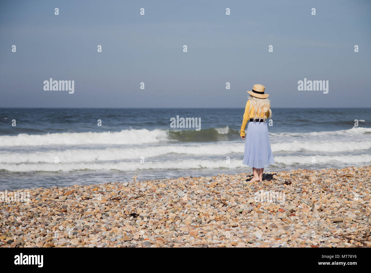 Lady at the beach hi-res stock photography and images - Alamy