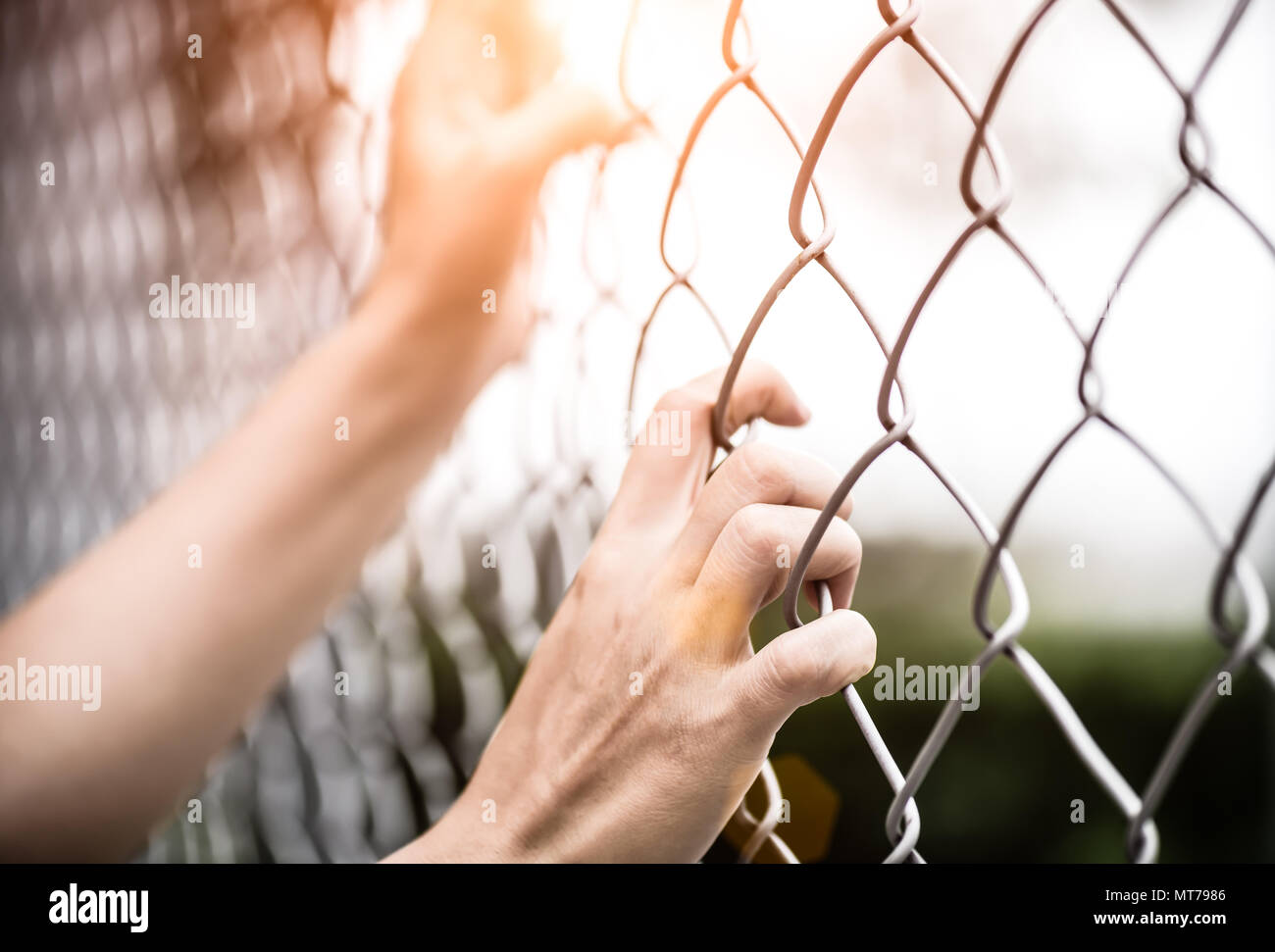 Hand chain link fence hi-res stock photography and images - Alamy