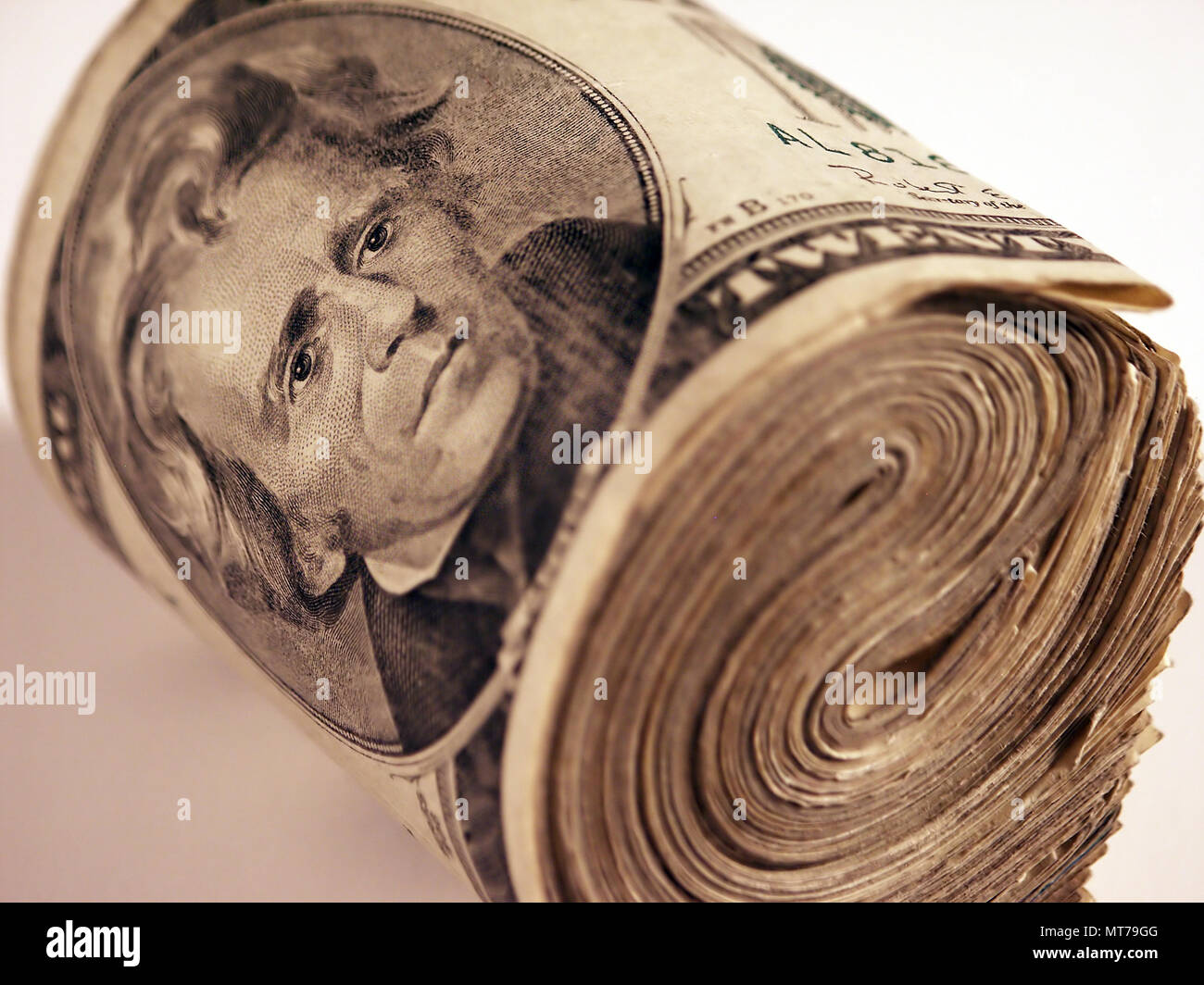 Twenty dollars banknotes money roll Stock Photo - Alamy