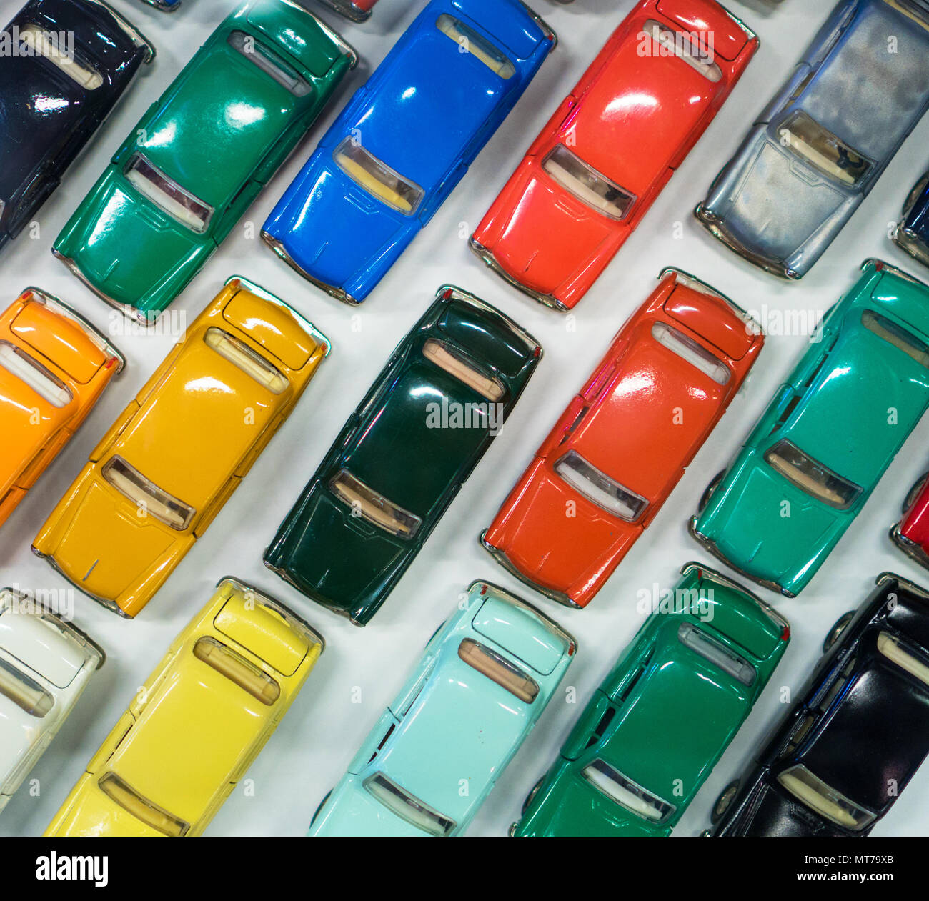 Collection of colorful toy car models on exhibition Stock Photo - Alamy