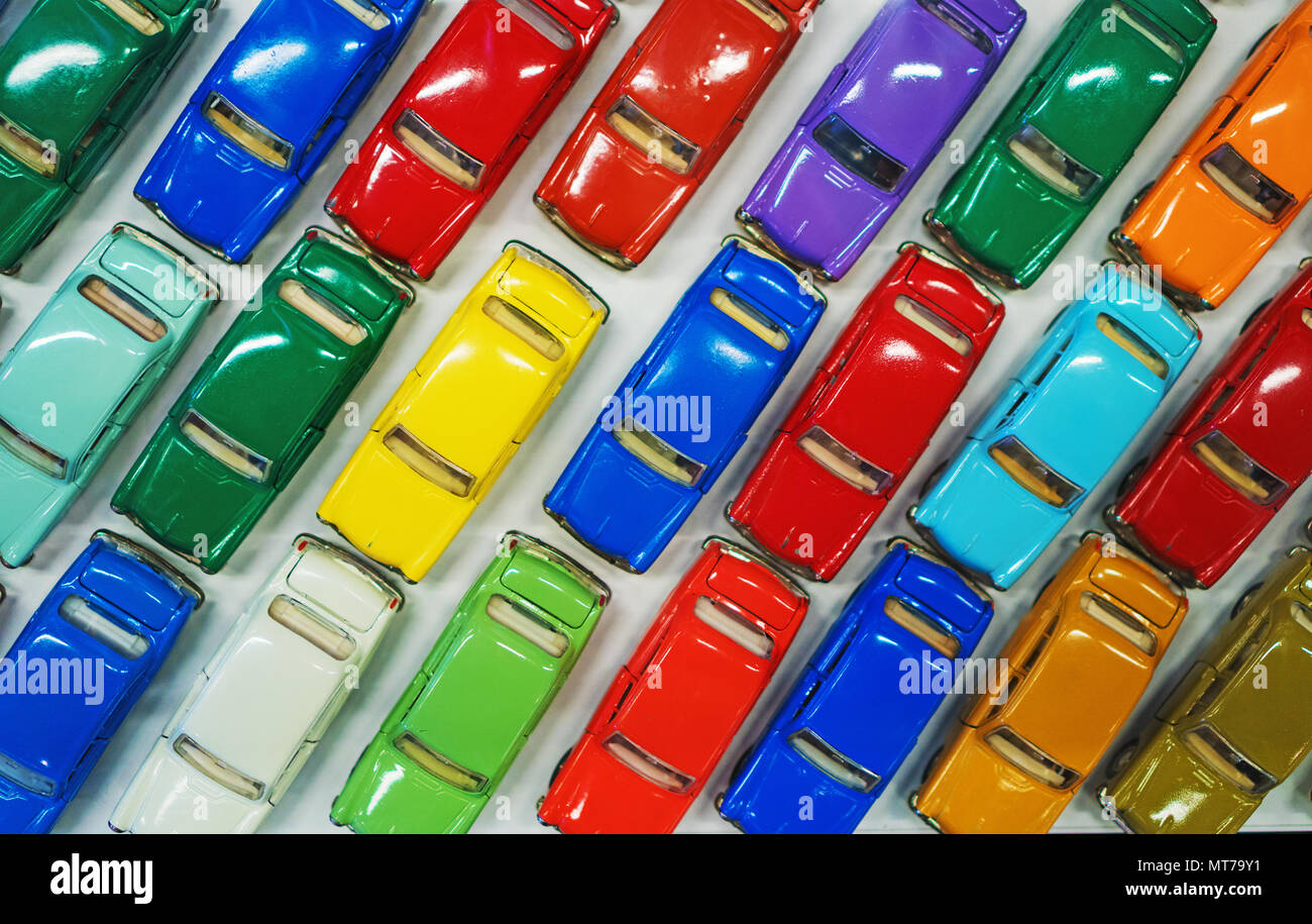 Collection of colorful toy car models on exhibition Stock Photo - Alamy