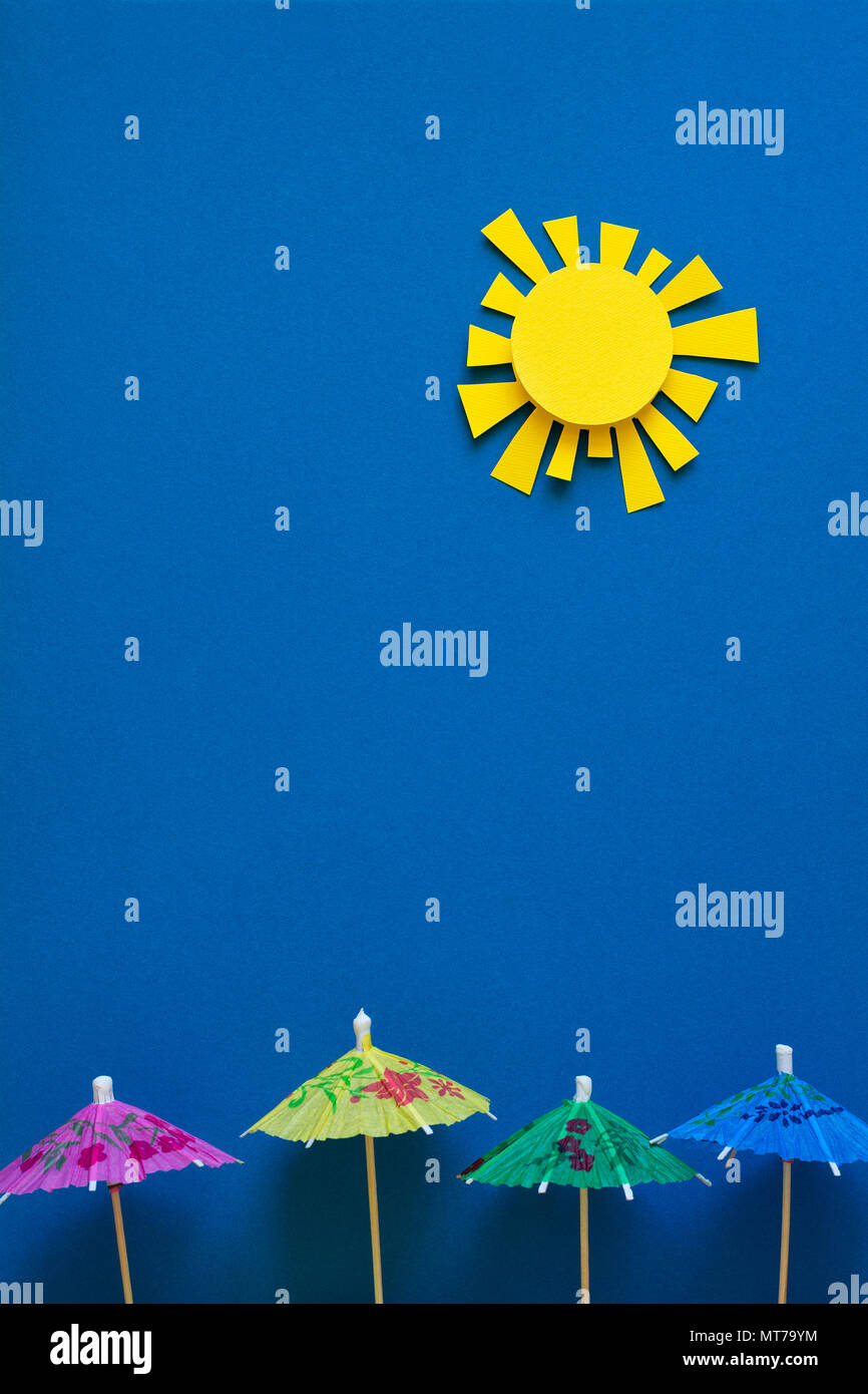Paper umbrellas under sun. Origami. Sun protection and summer vacation ...