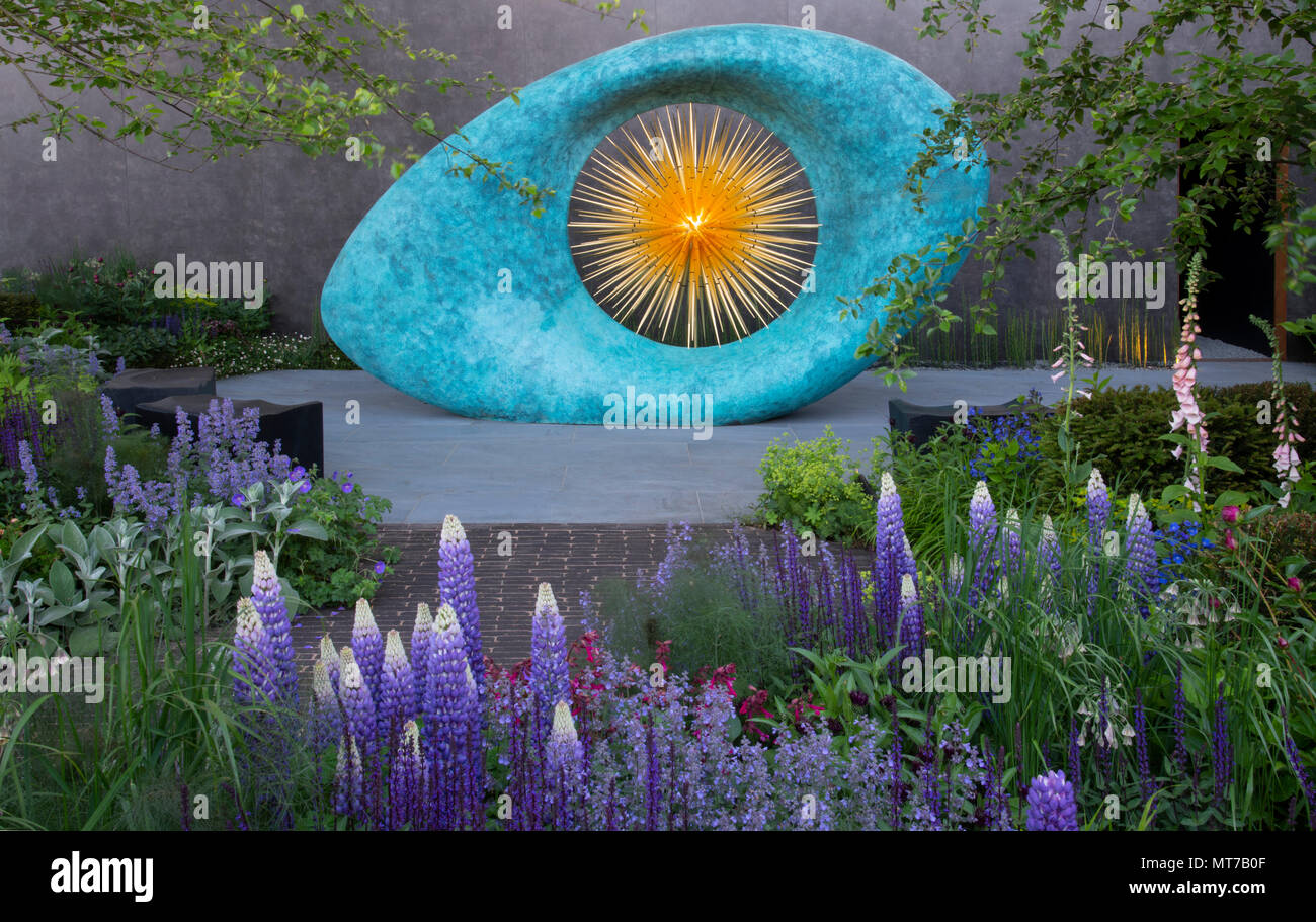 An eye catching sculpture by David Harber surrounded by Lupinus ‘West ...