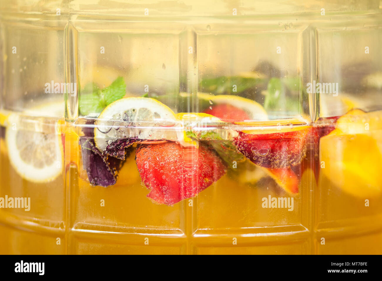 Fruit punch in a glass decanter closeup. Tasty drink Stock Photo - Alamy