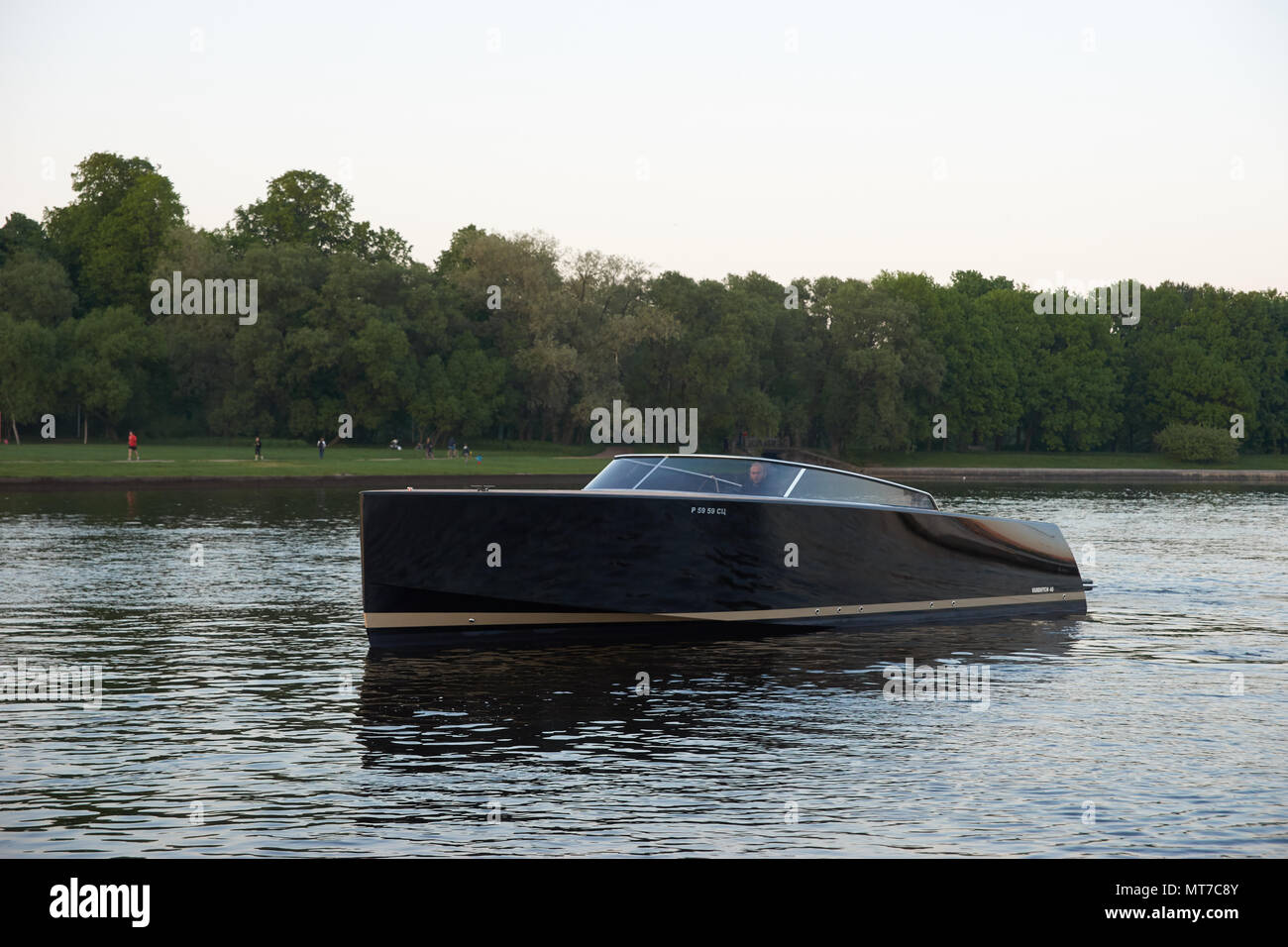 Motor boat on water Stock Photo - Alamy