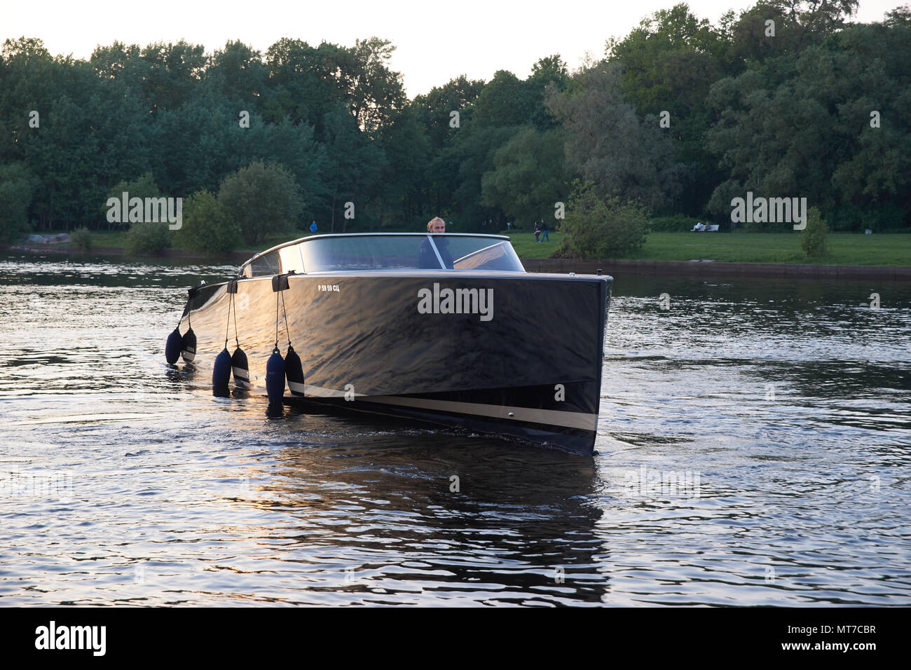 Motor boat on water Stock Photo - Alamy