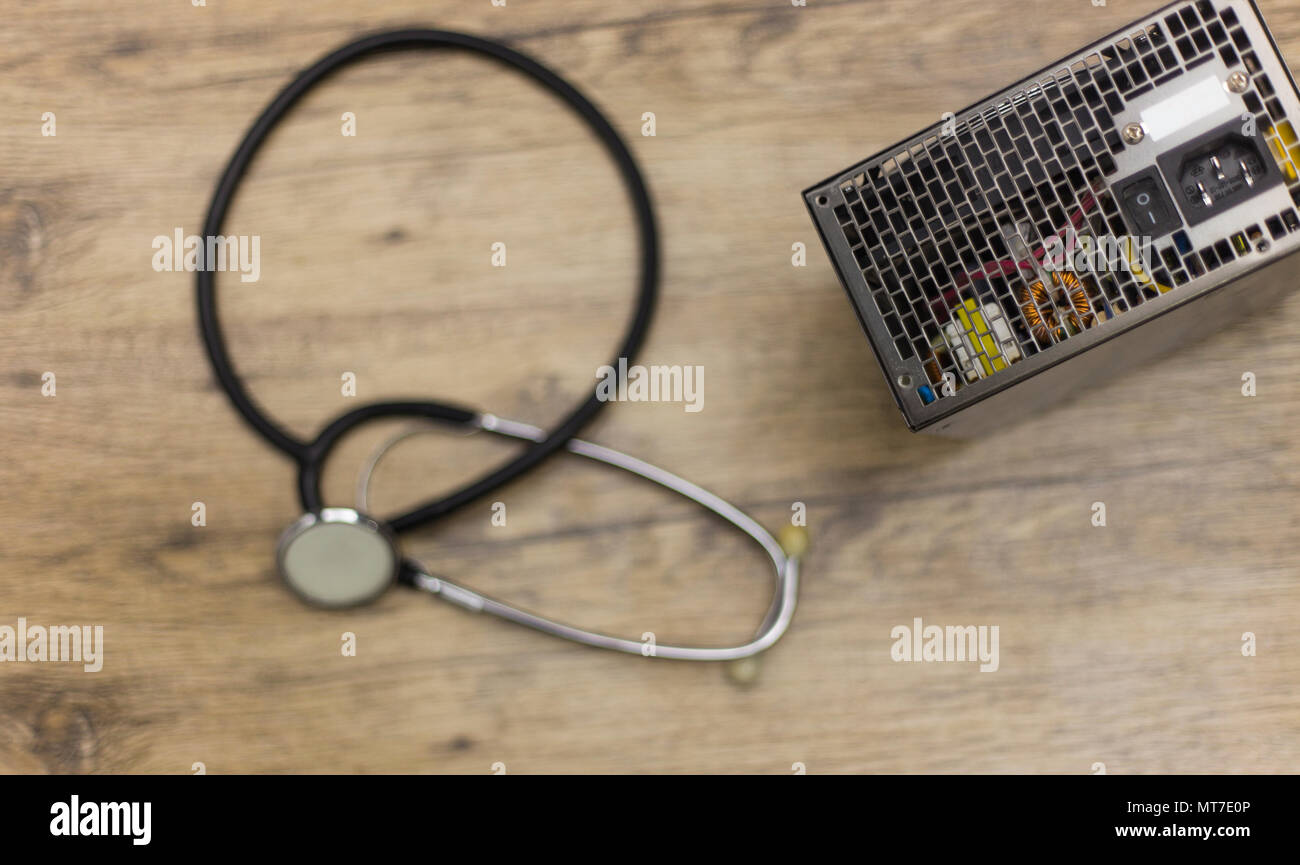 computer power suply representing a phonendoscope health and wellness ...