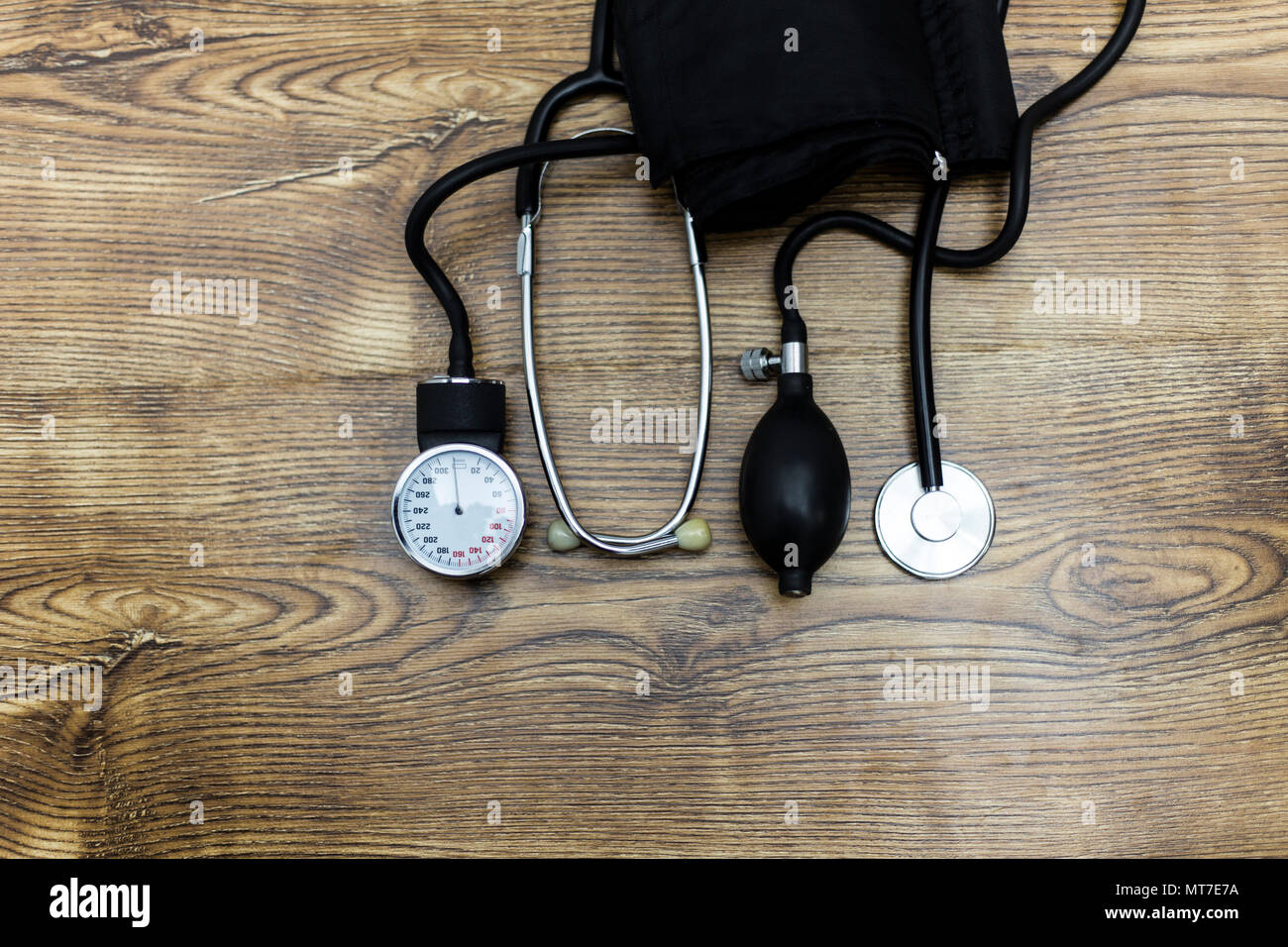 Scale of pressure and stethoscope on wood board Stock Photo - Alamy