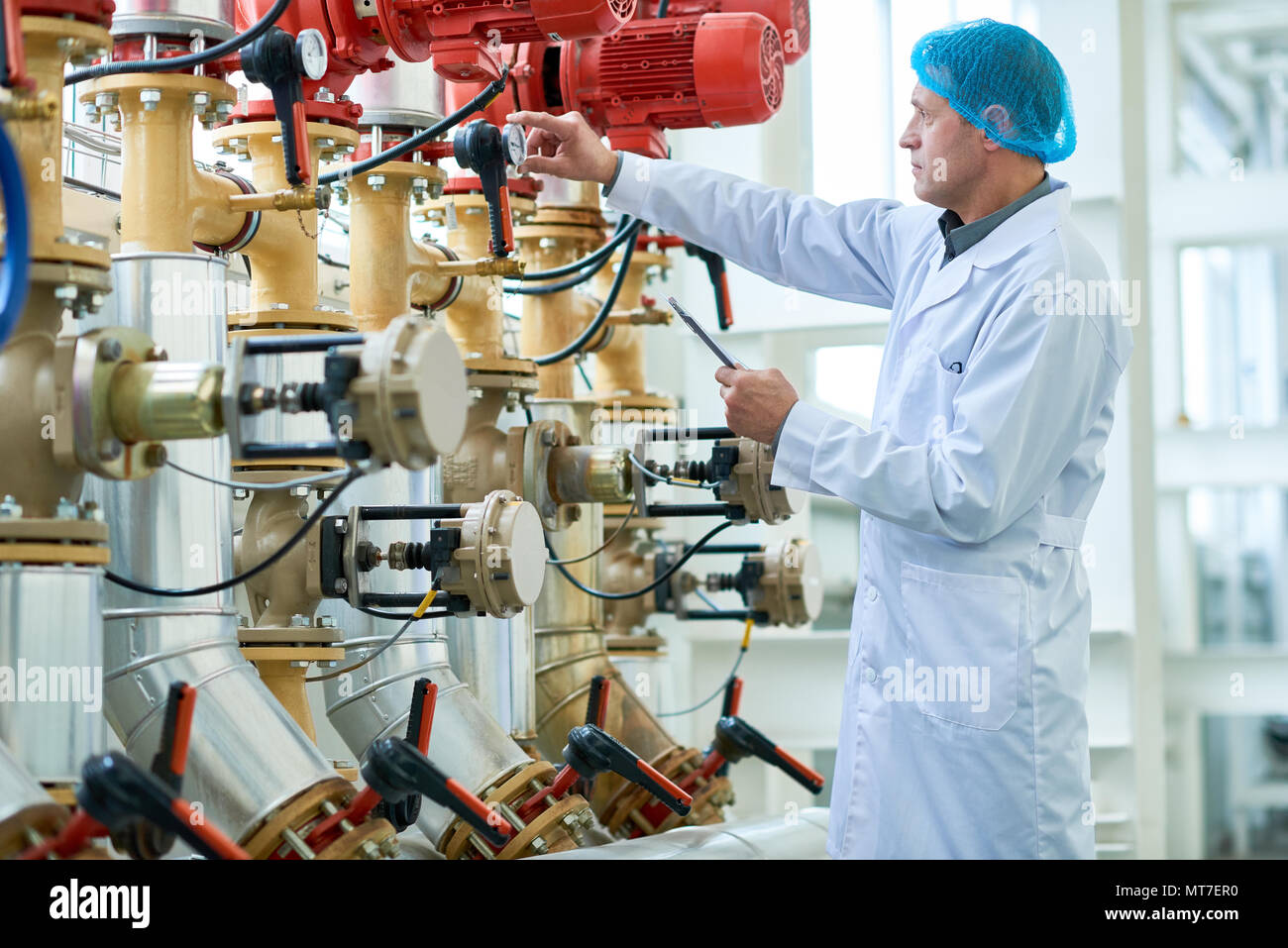 Checking plant pipes hi-res stock photography and images - Alamy