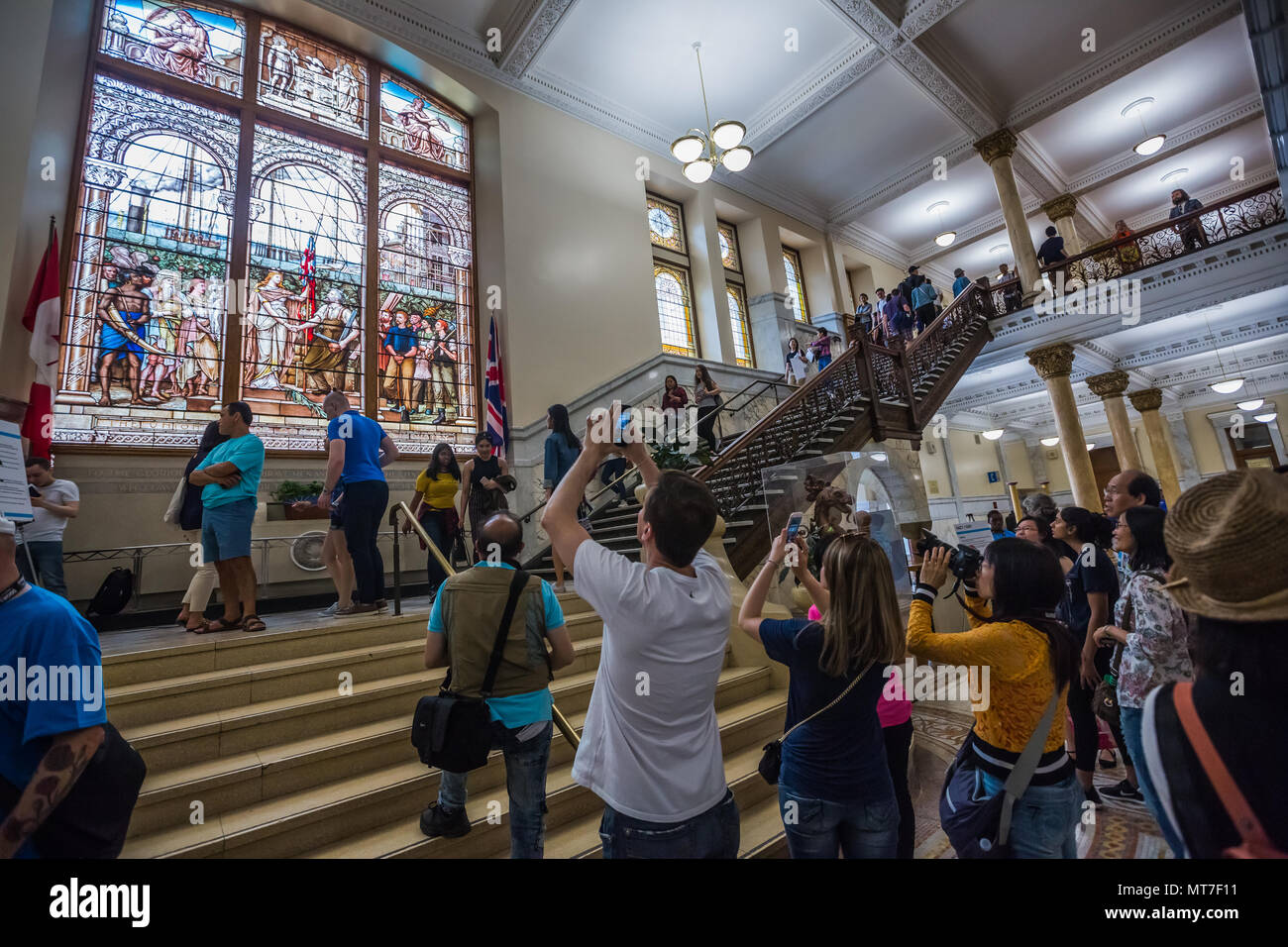 tourists inside old city hall toronto canada Stock Photo - Alamy