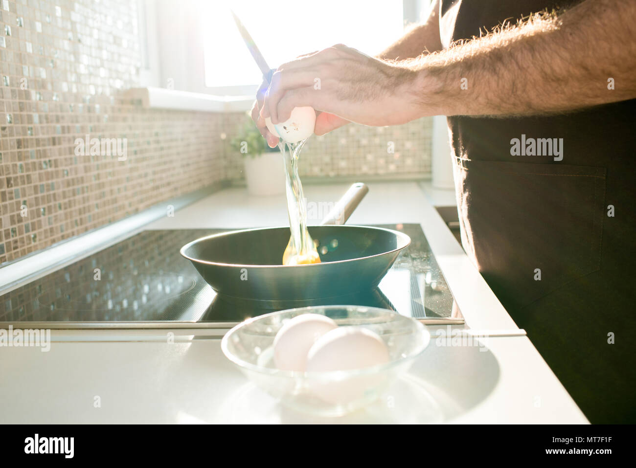 Person making breakfast hi-res stock photography and images - Alamy