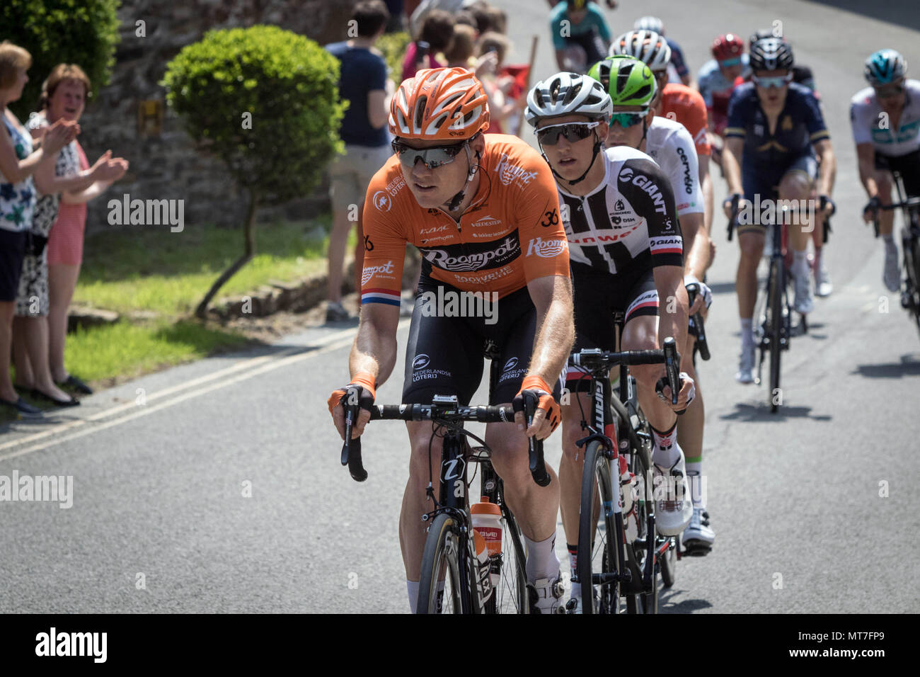 Riders begin the climb out of the hamlet during the Cote de Goose Eye ...