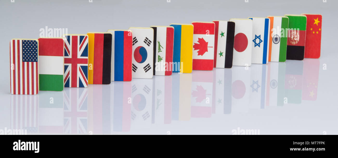 The domino effect with tiles of flags of different countries of the ...