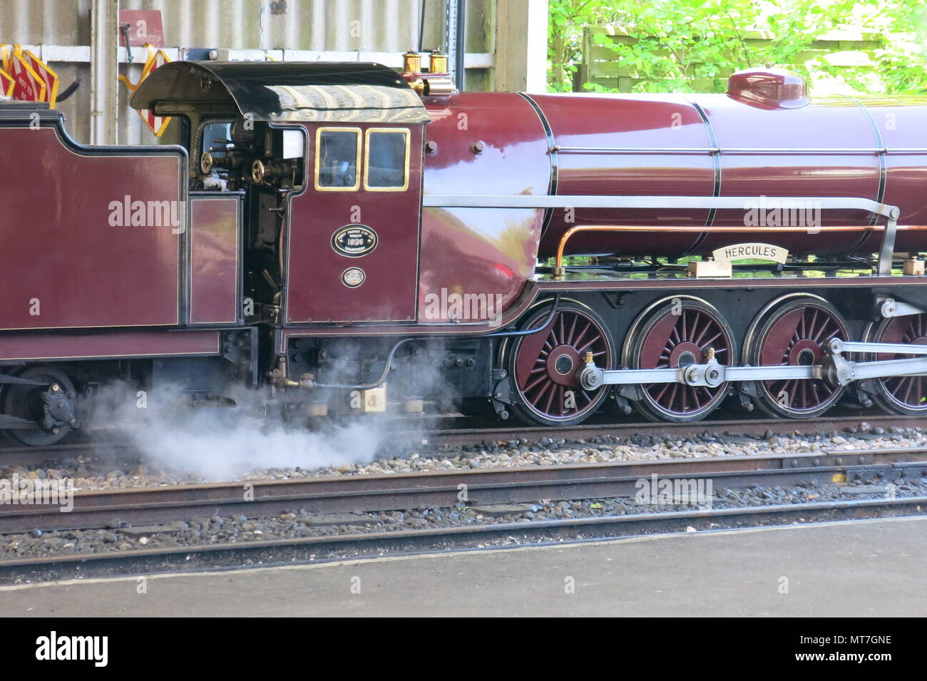 Steam locomotive Hercules in its fine red livery on the Romney, Hythe ...