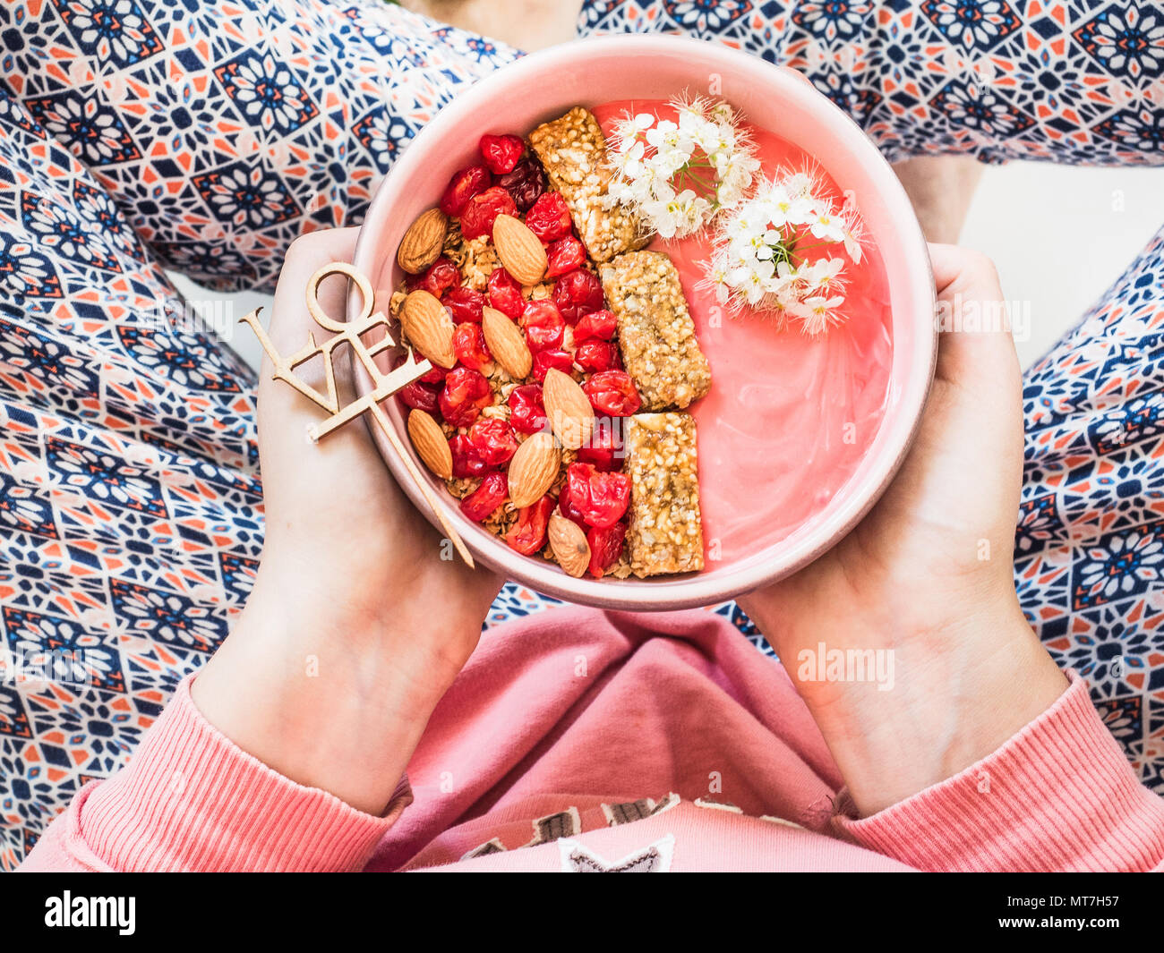 Berry smoothie, muesli and word LOVE Stock Photo - Alamy