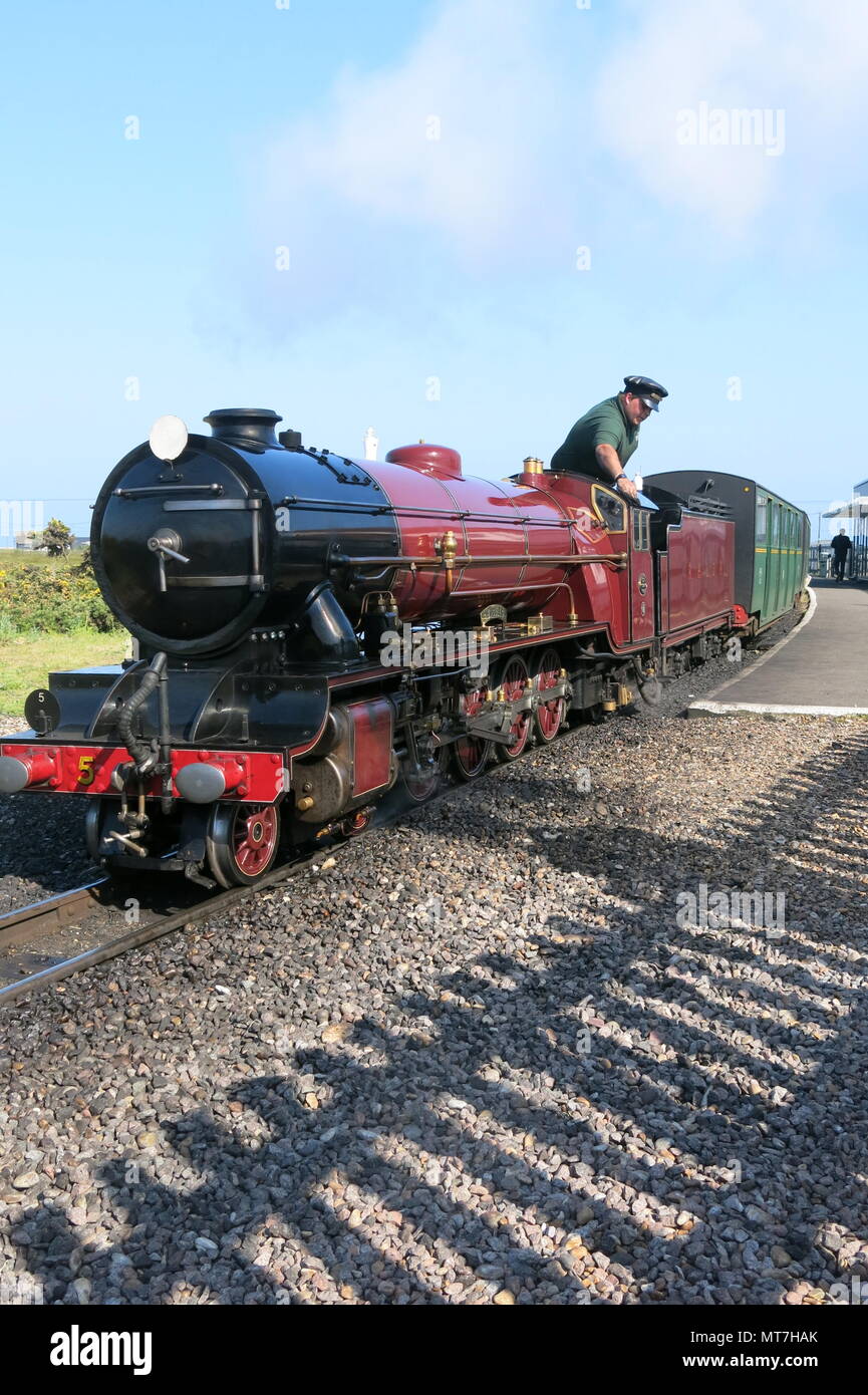 Steam locomotive Hercules in its fine red livery on the Romney, Hythe ...