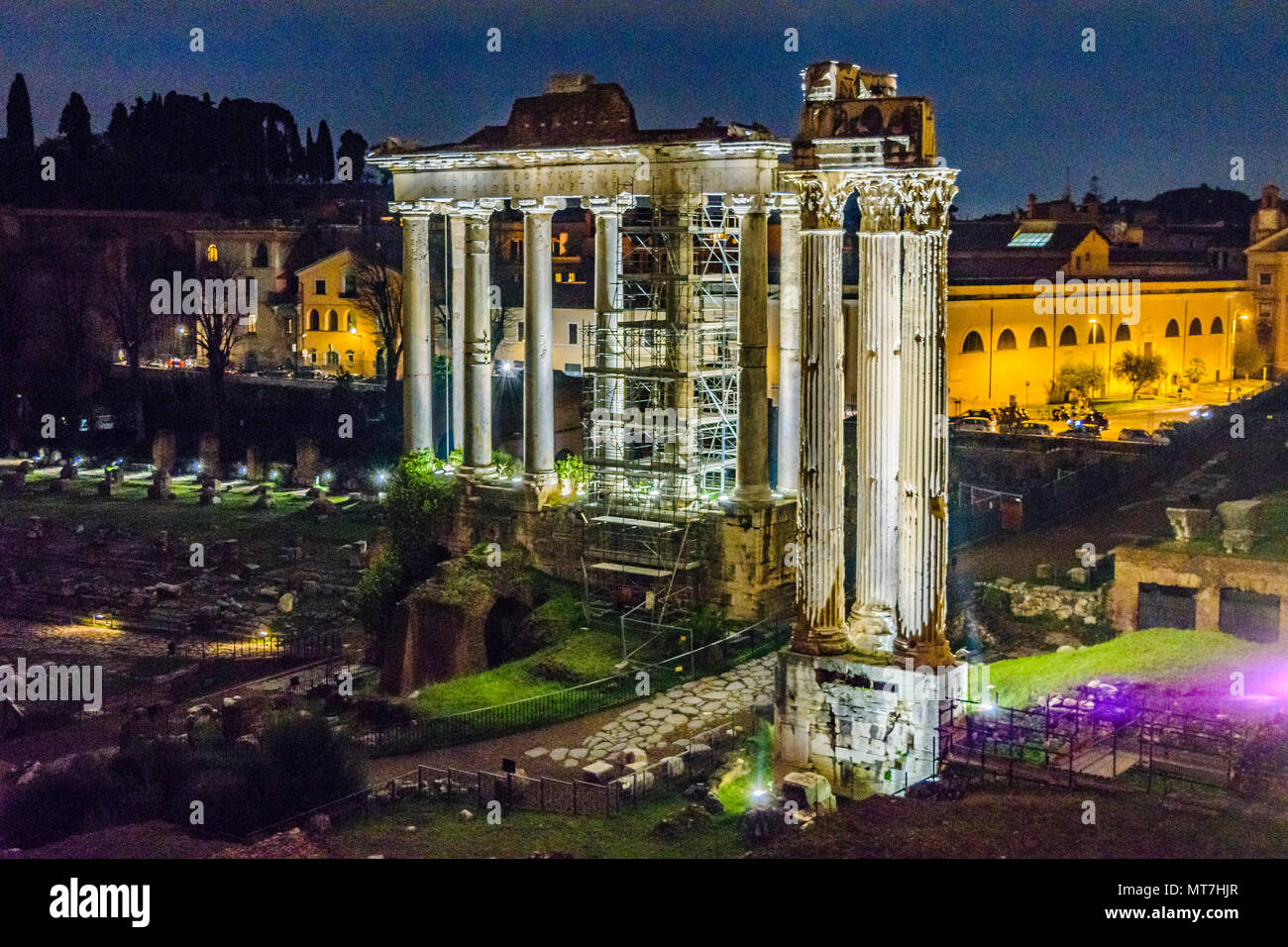 Night scene of roman forum buildings in Rome city, Italy Stock Photo ...