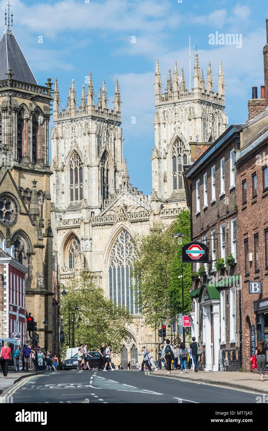 Street scene within the city walls of York with York Minster Cathedral ...