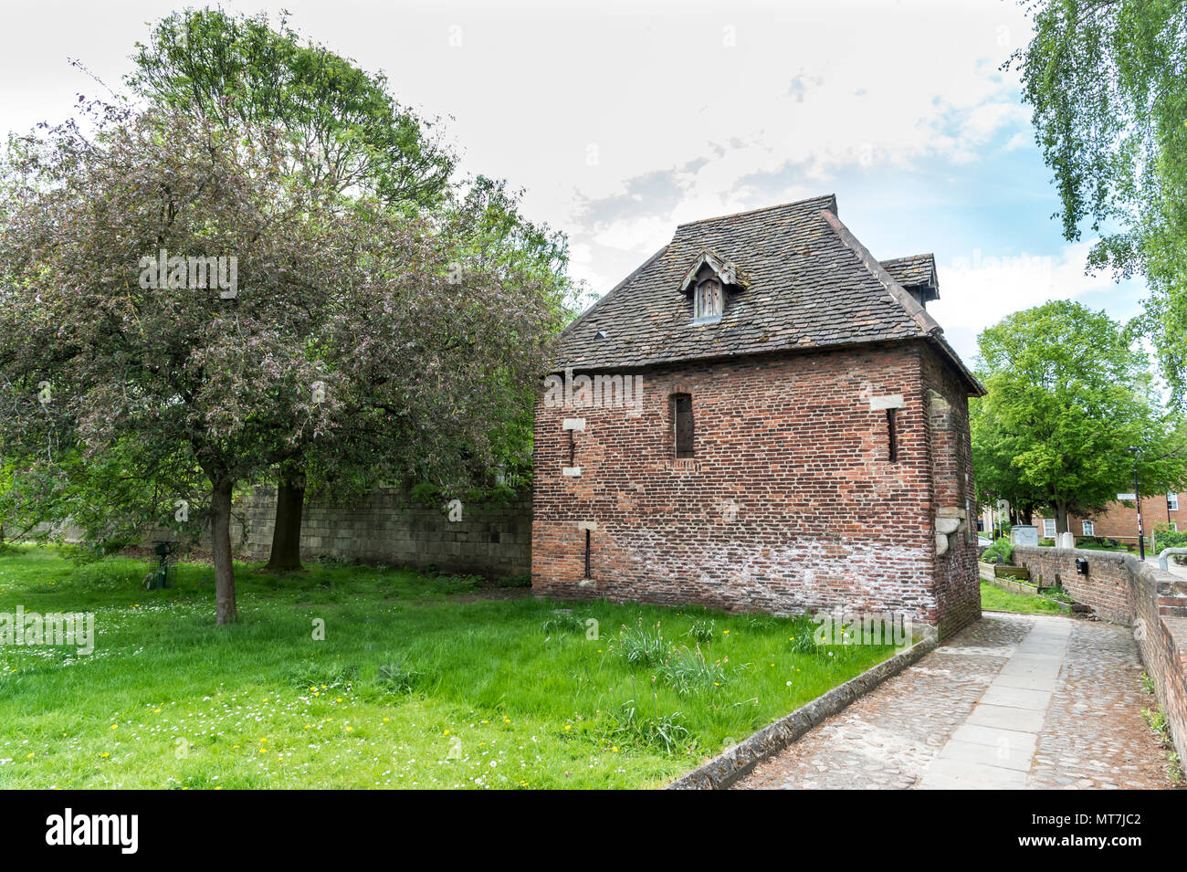 Street scene at the Red Tower, a toll gate tower on the city wall ...
