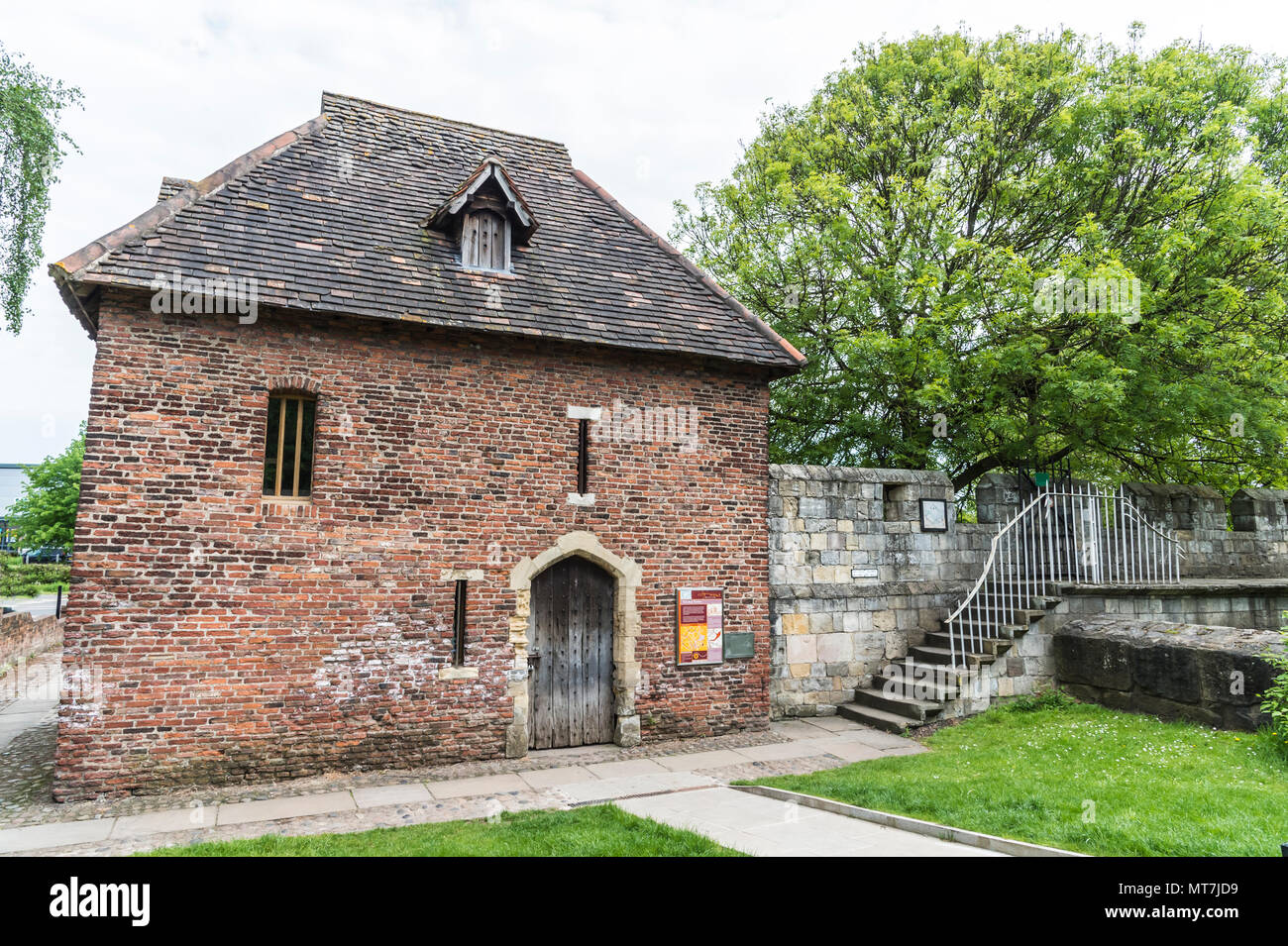 Street scene at the Red Tower, a toll gate tower on the city wall ...