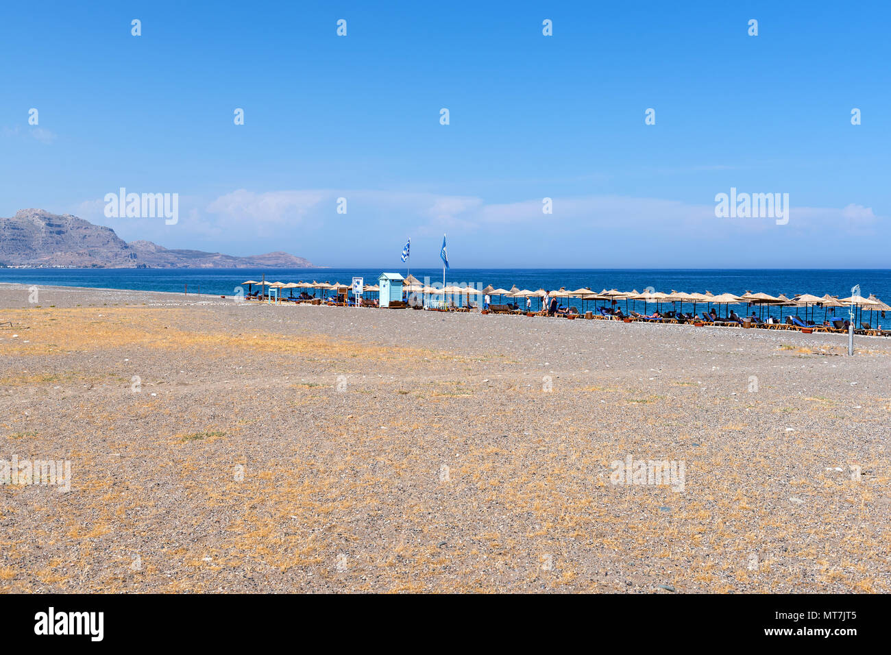 Kalathos beach located near Kalathos village. Pebble and sandy beach ...