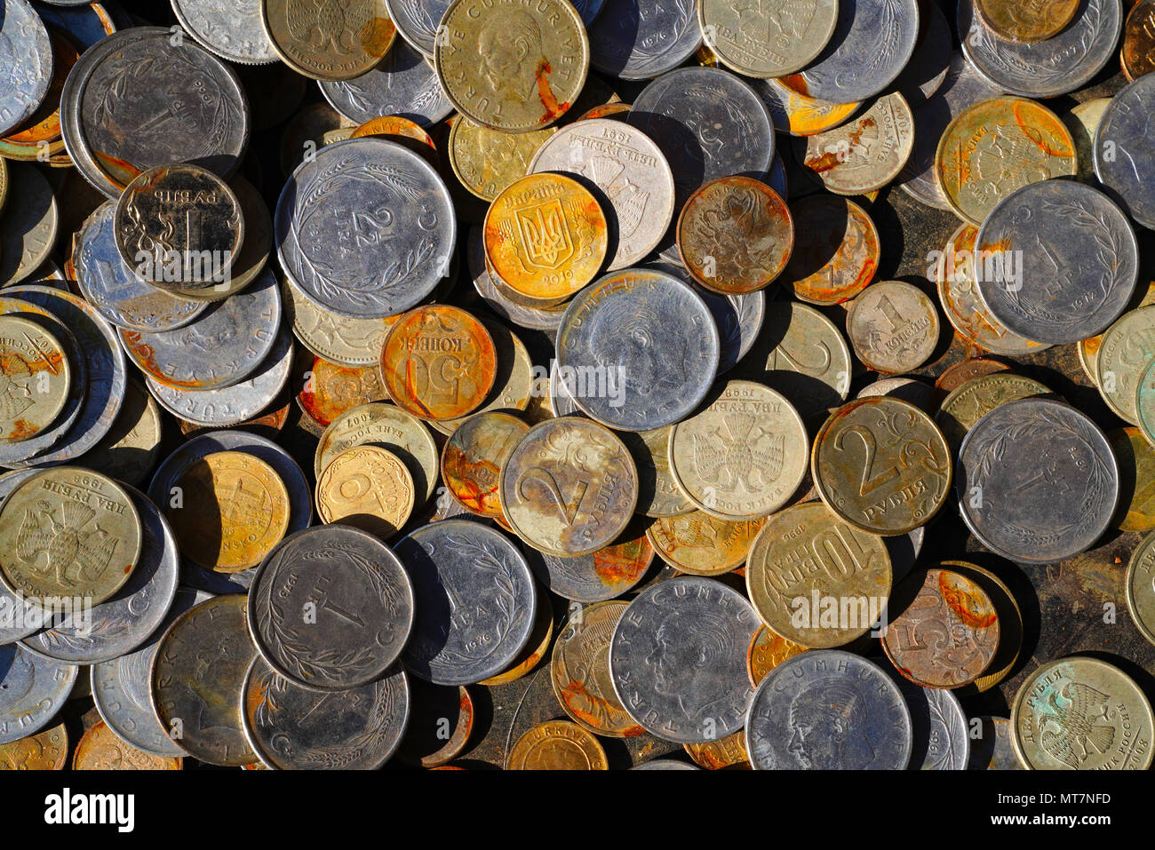 Pile of rusty coins background Stock Photo - Alamy