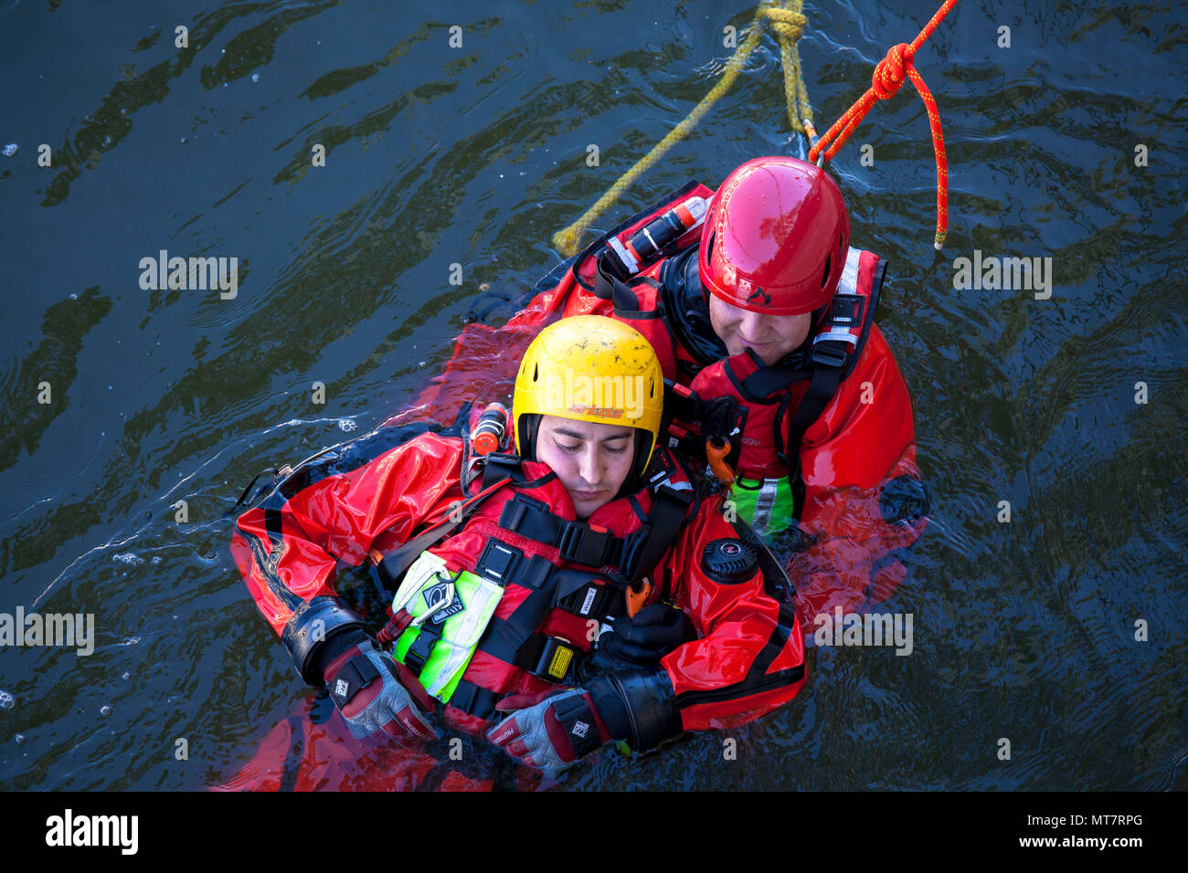 Germany, Cologne, firefighters practise the rescue of a drowning man in ...